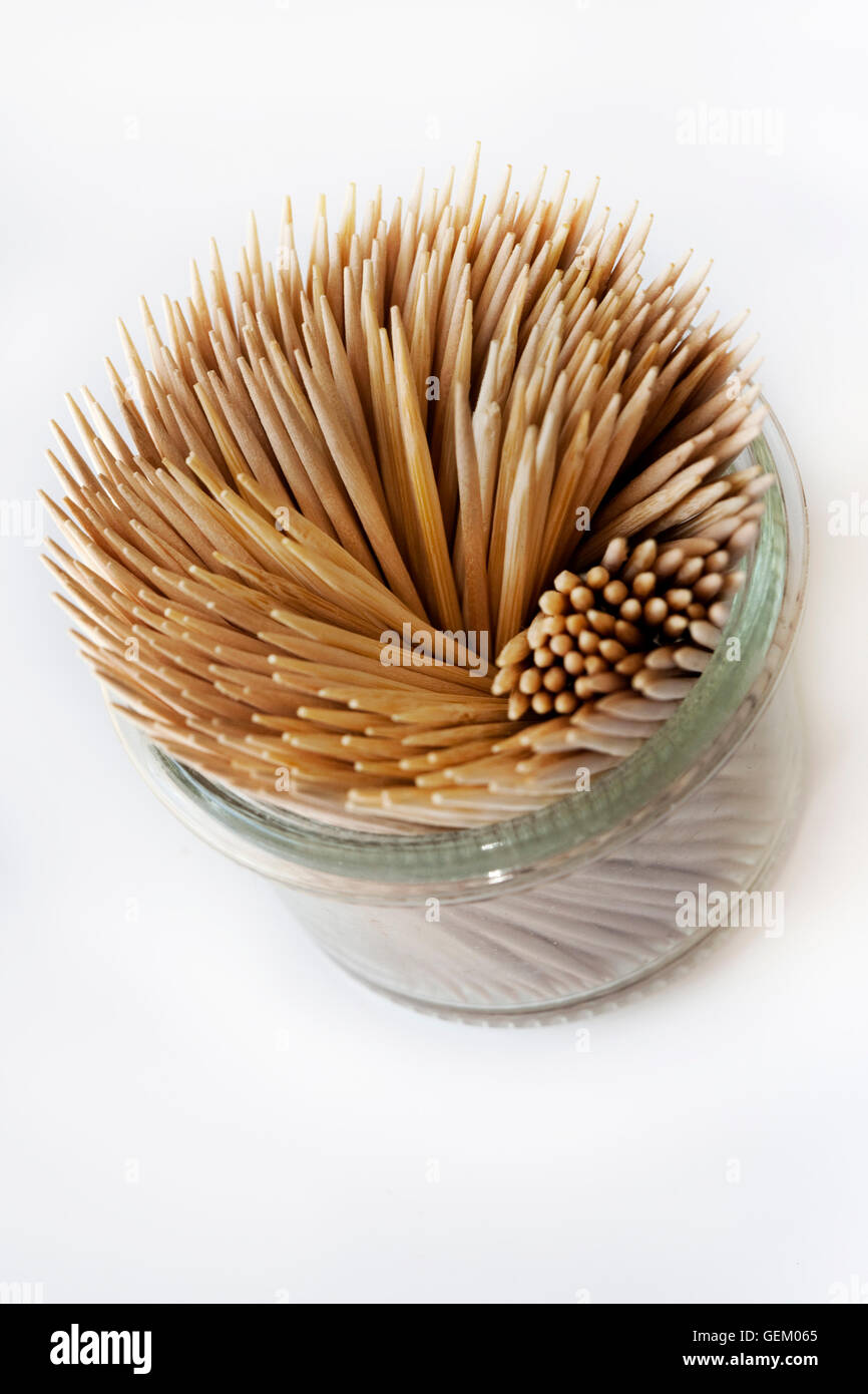 Toothpick in a glass on a white background Stock Photo - Alamy