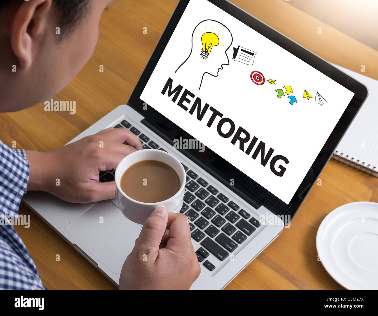 MENTORING Businessman at work. Close-up top view of man working on ...