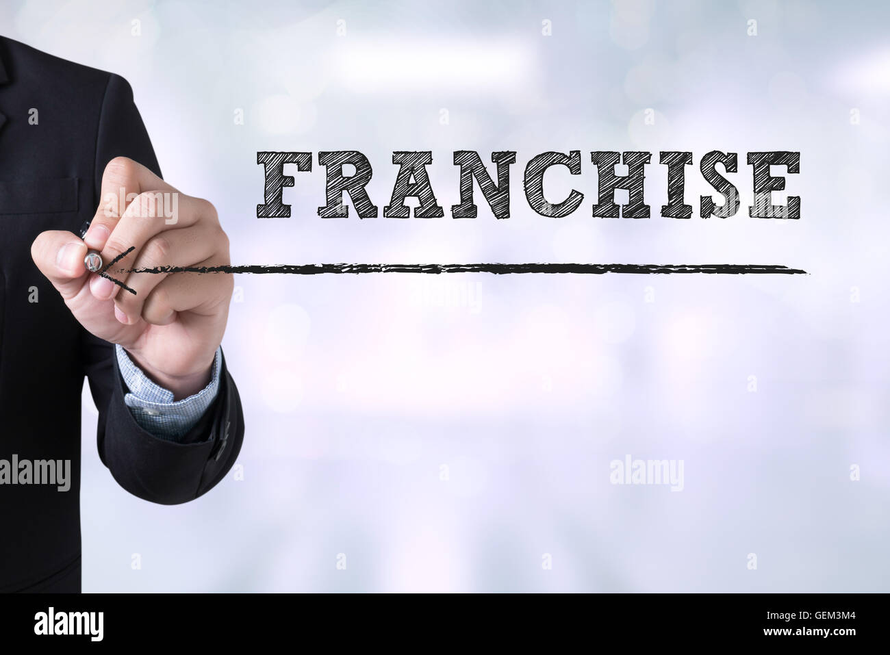 FRANCHISE Businessman drawing Landing Page on blurred abstract ...