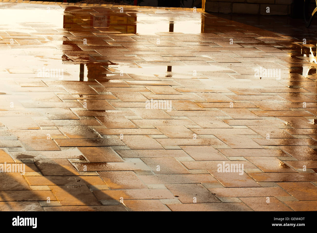 Puddle of water in rainy day Stock Photo - Alamy