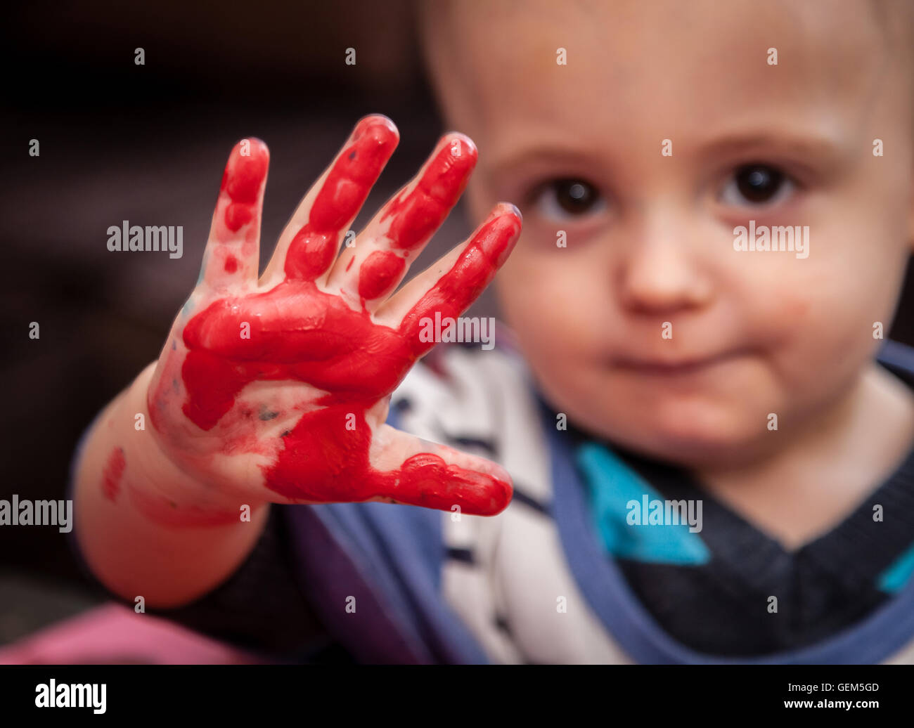 Child's hand with colored fingers from using paint Stock Photo - Alamy