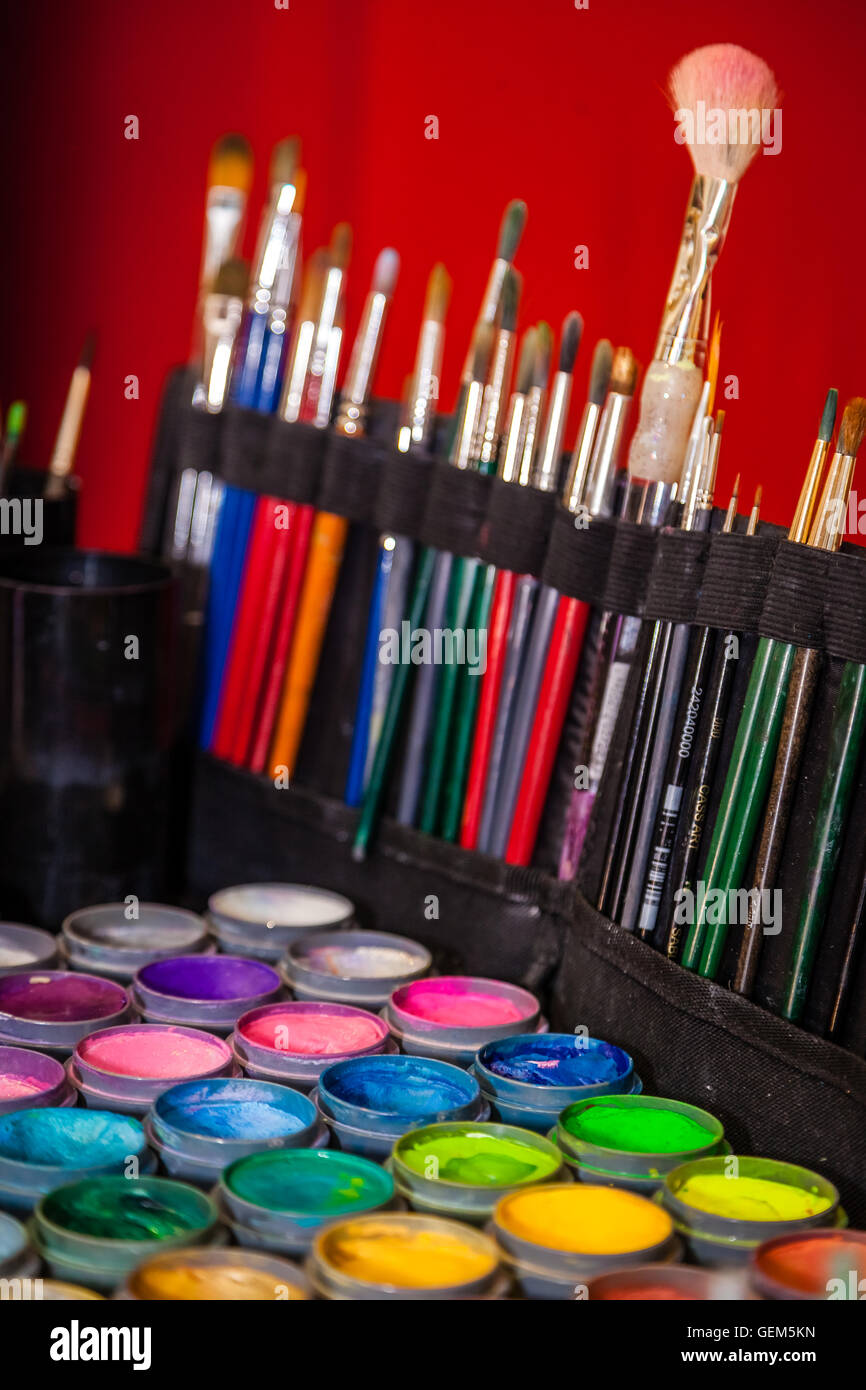 Colorful paint tubes and brushes used for face art painting Stock Photo ...
