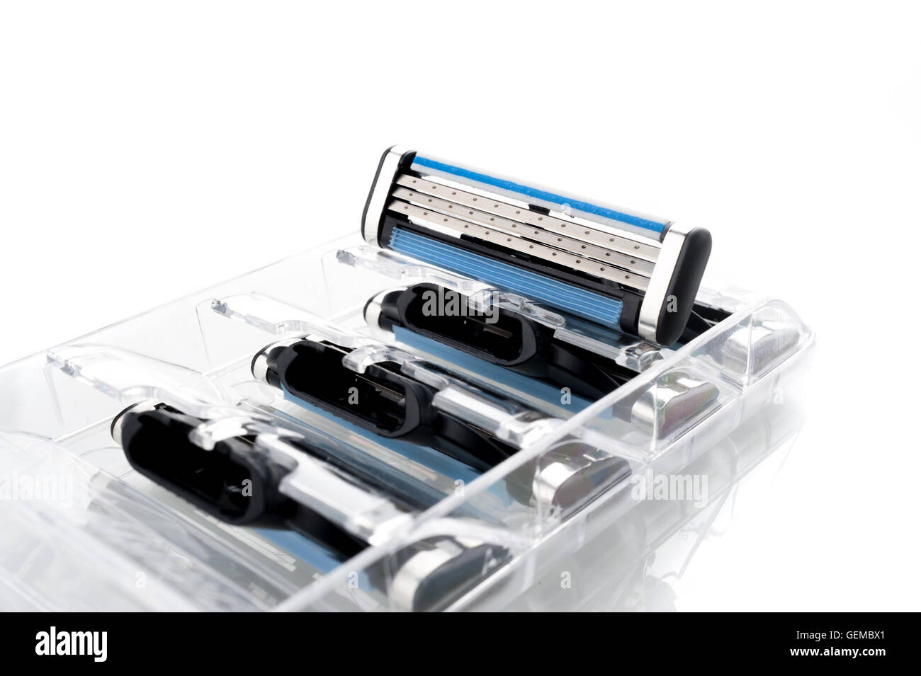 closeup new multiple blade razor on white background Stock Photo - Alamy