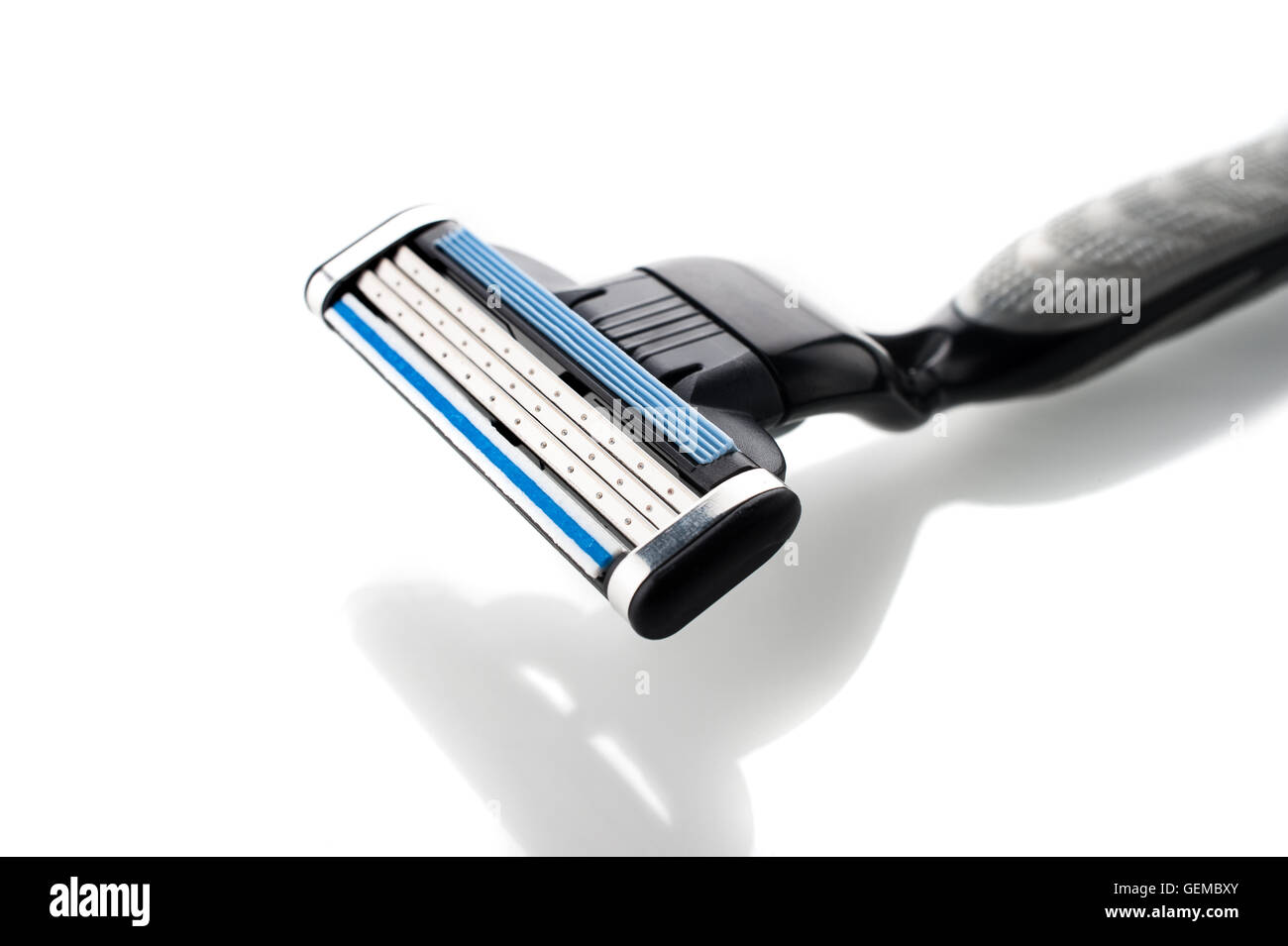 closeup new multiple blade razor on white background Stock Photo - Alamy