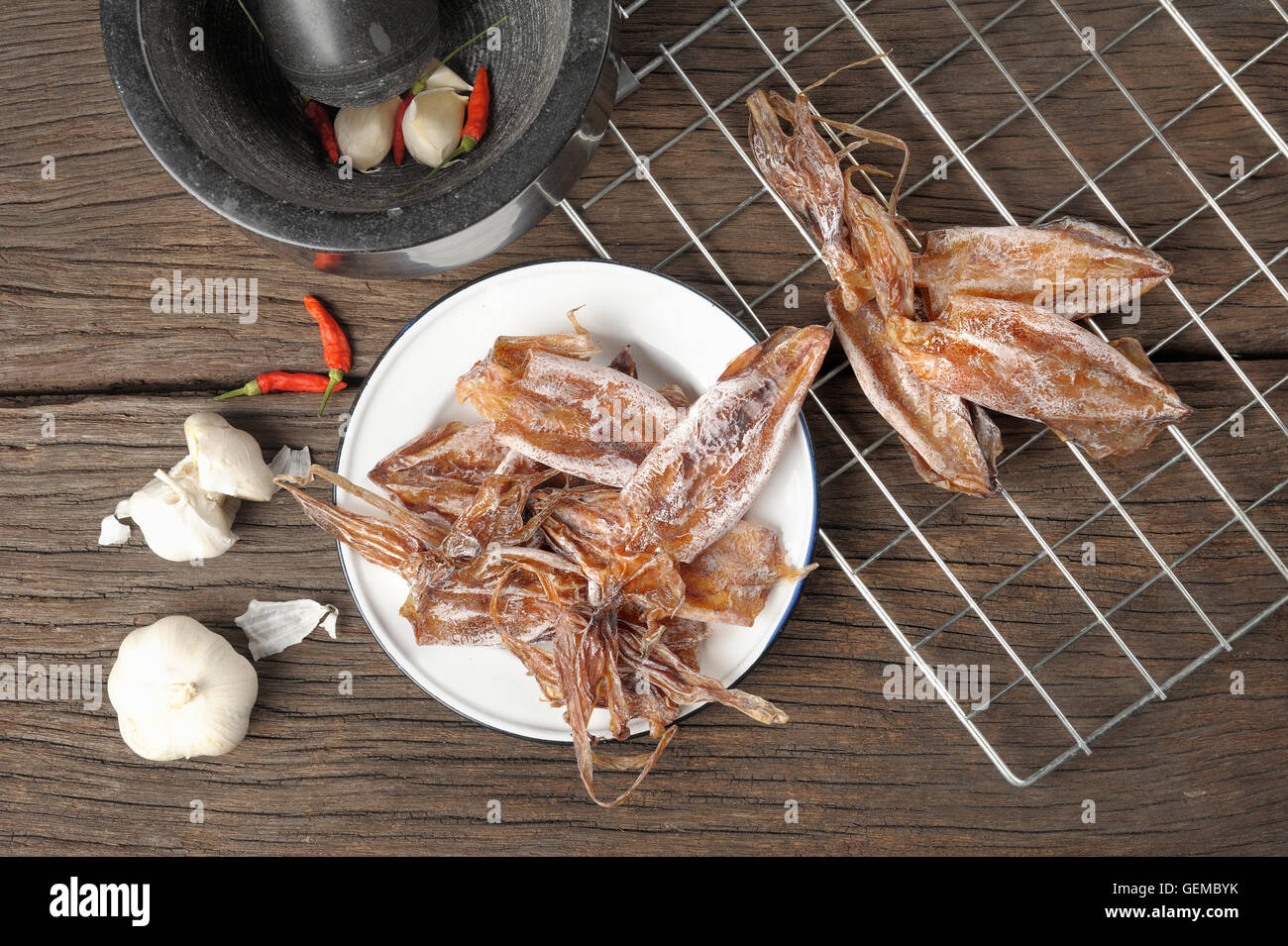 dry squids in the kitchen Stock Photo - Alamy