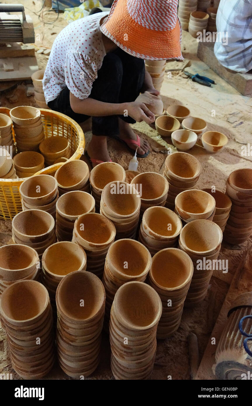 Asian worker working at wood workshop, Vietnamese make product from ...