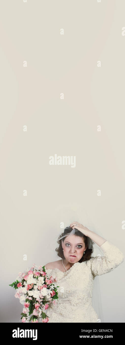 Upset bride with bouquet skyscraper banner Stock Photo - Alamy