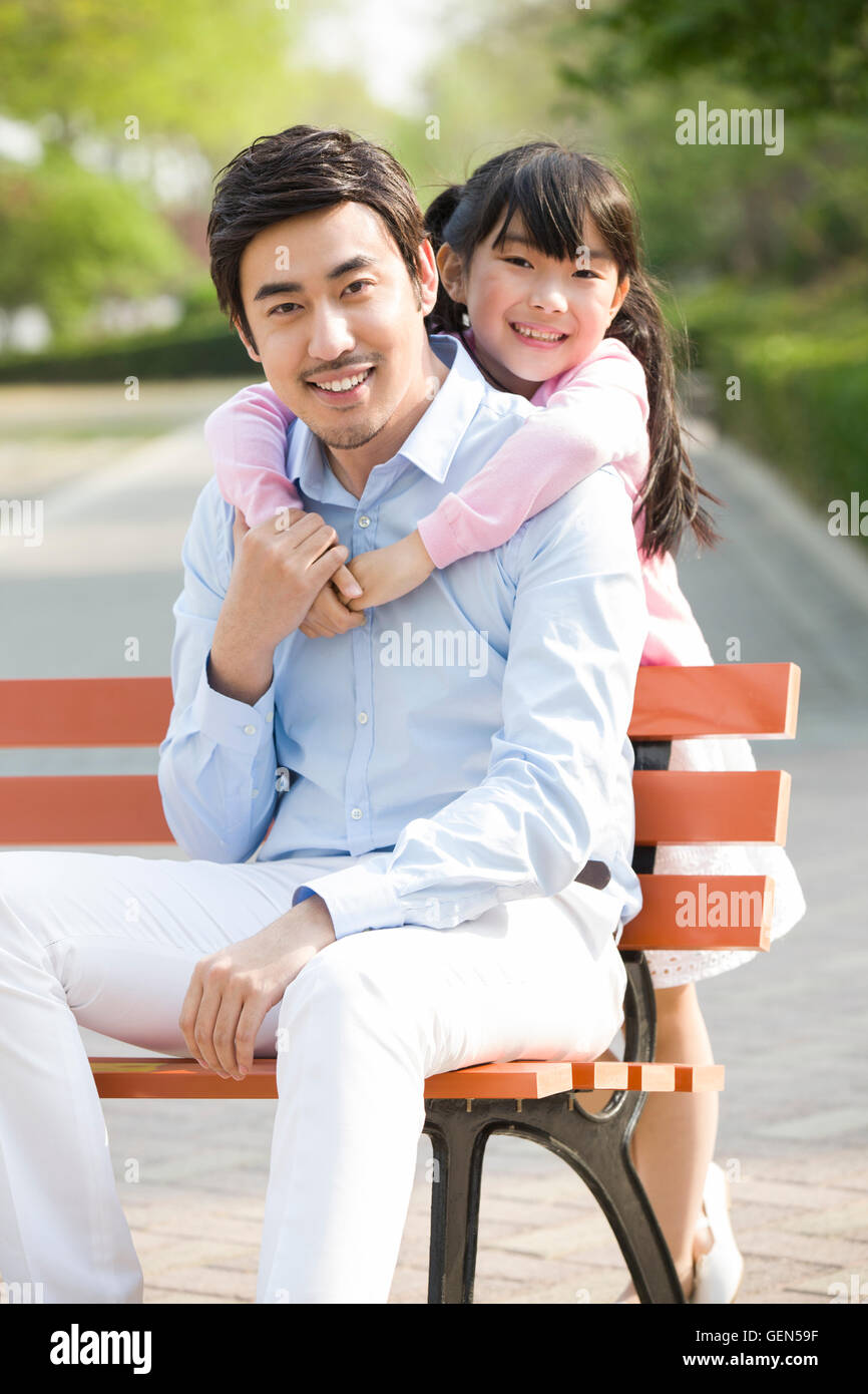 Portrait of happy Chinese father and daughter Stock Photo - Alamy