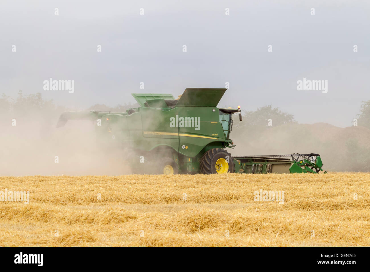 John Deere hillmaster combine harvester working near Ecton ...