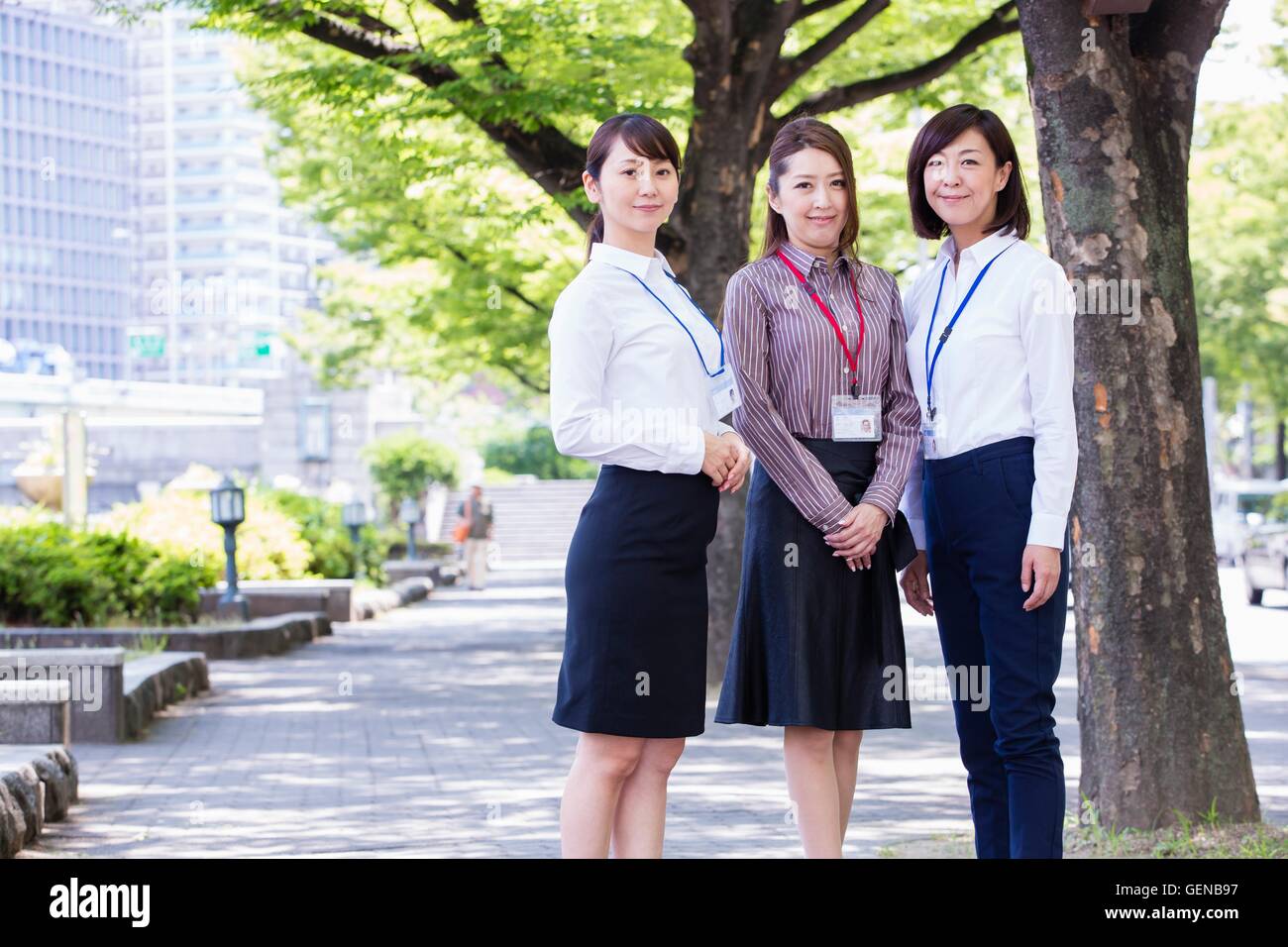 Business women standing outside Stock Photo - Alamy