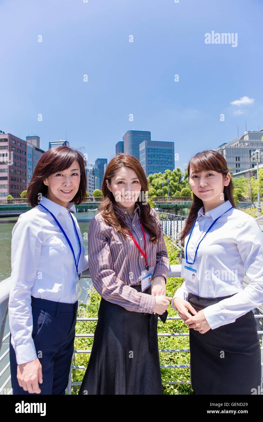 Business women standing outside Stock Photo - Alamy