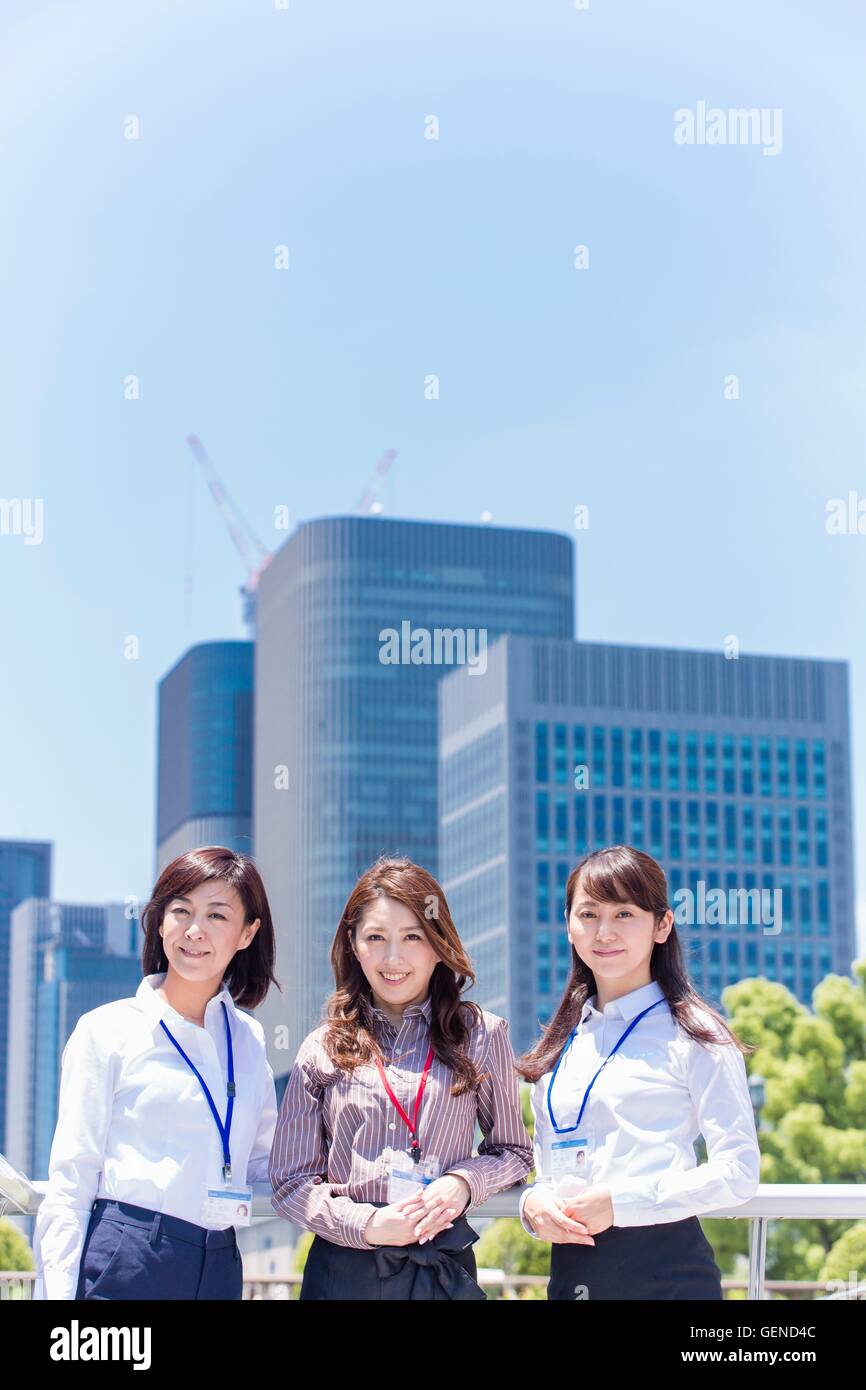 Business women standing outside Stock Photo - Alamy