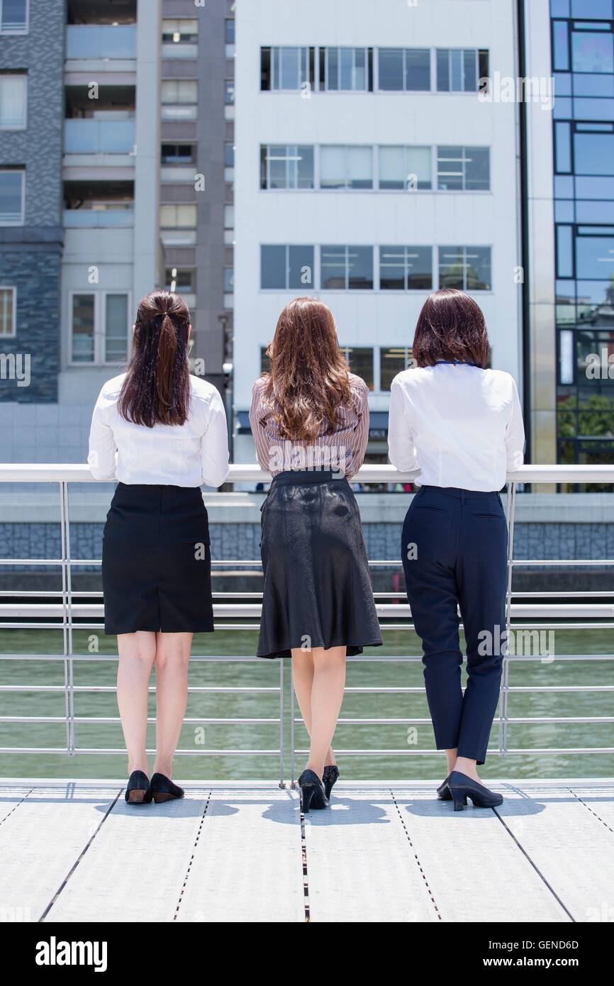 Business women standing outside Stock Photo - Alamy