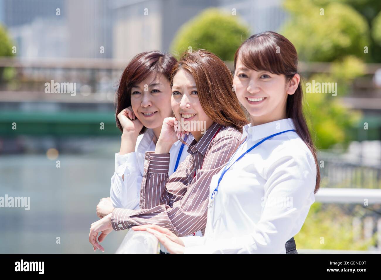 Business women standing outside Stock Photo - Alamy