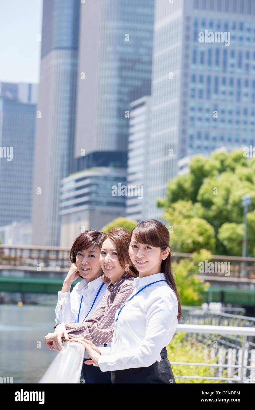 Business women standing outside Stock Photo - Alamy