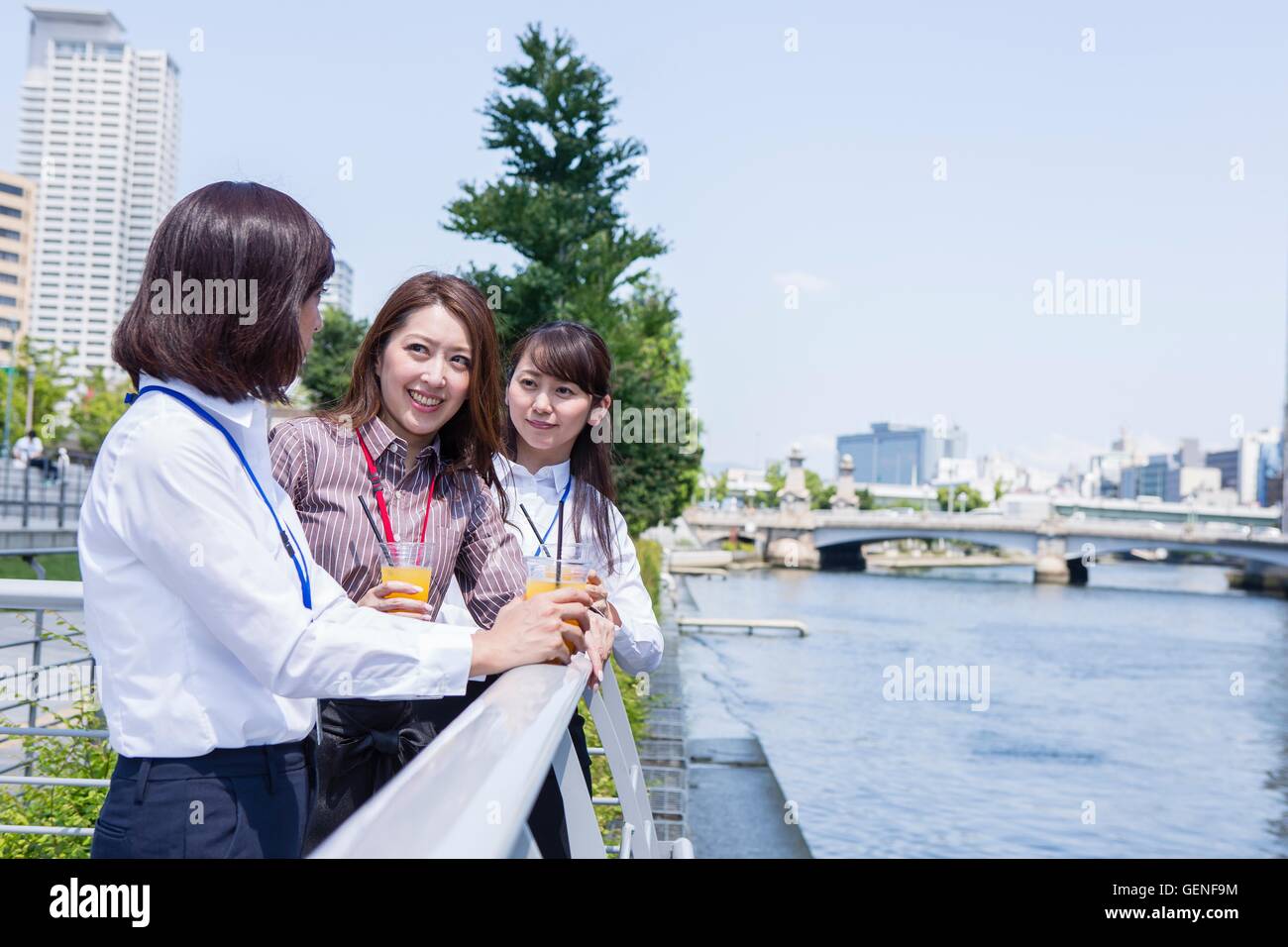 Business women talking outside Stock Photo - Alamy