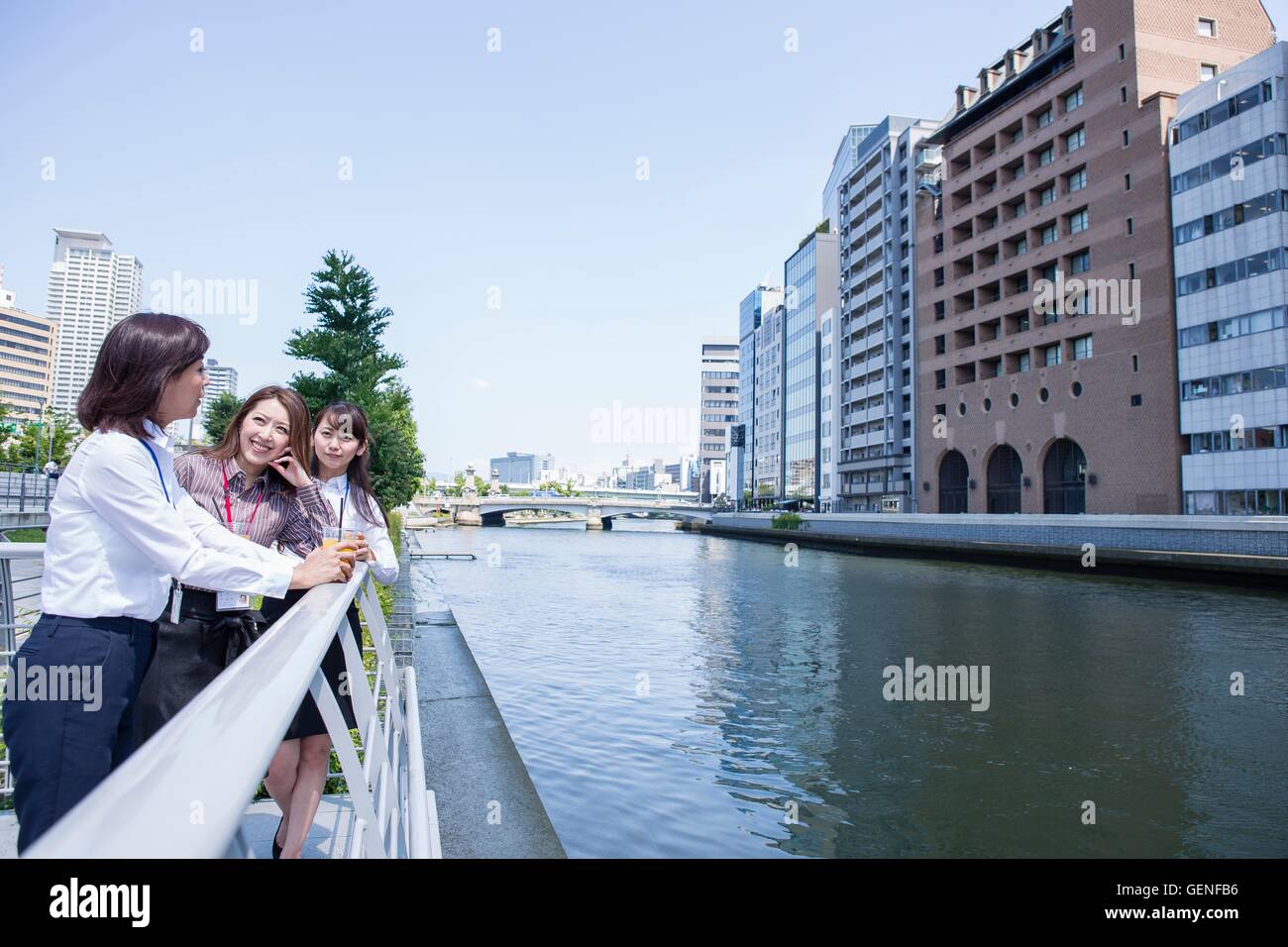 Business women talking outside Stock Photo - Alamy