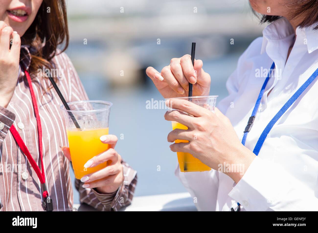 Business women talking outside Stock Photo - Alamy