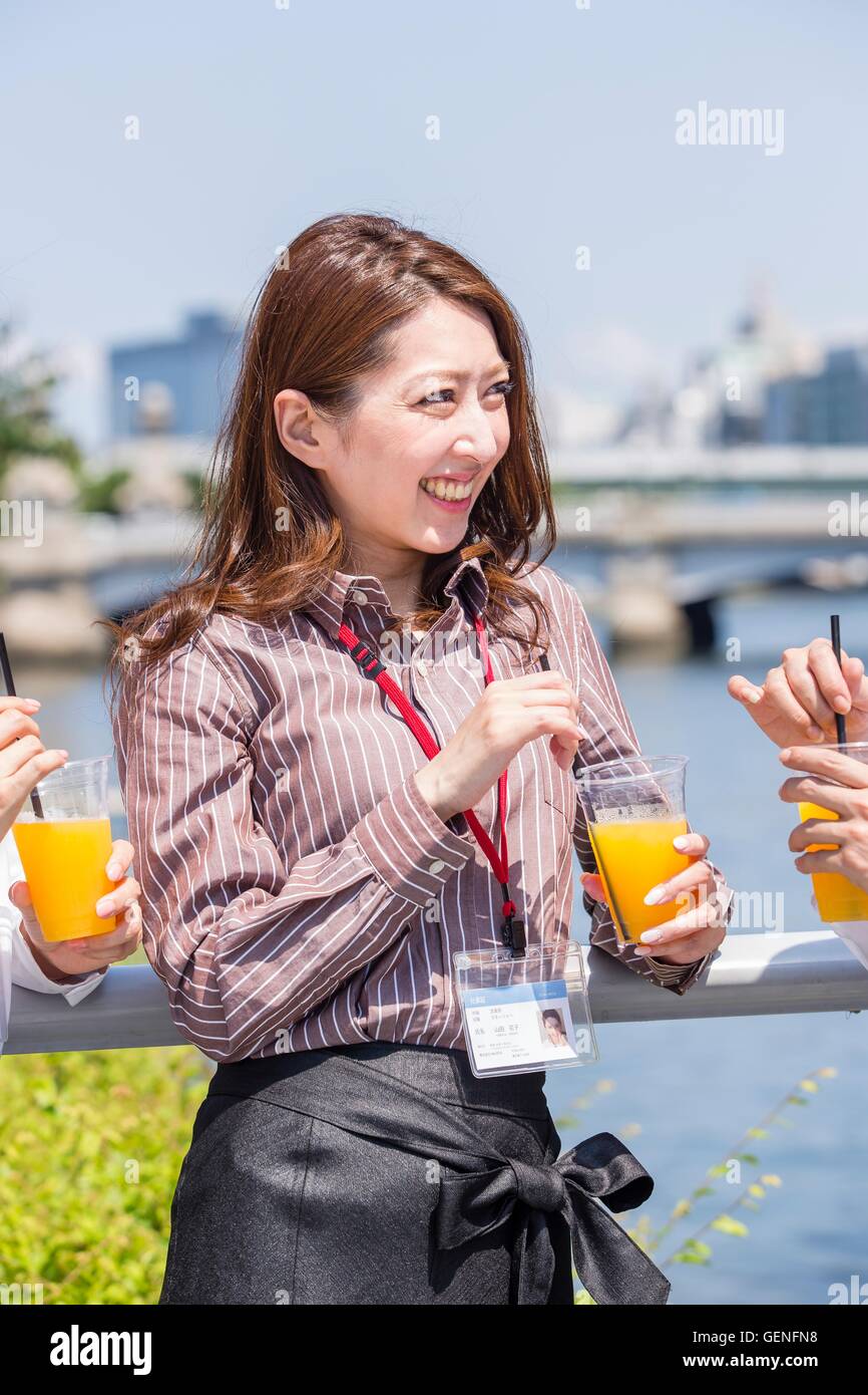 Business women talking outside Stock Photo - Alamy