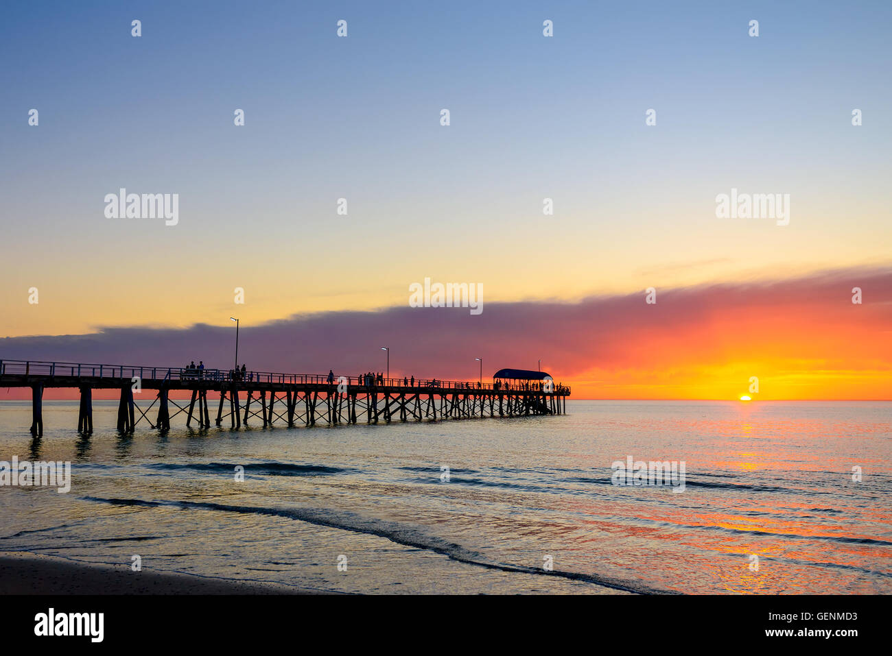 People relaxing on the Henley Beach Jetty at sunset, South Australia ...