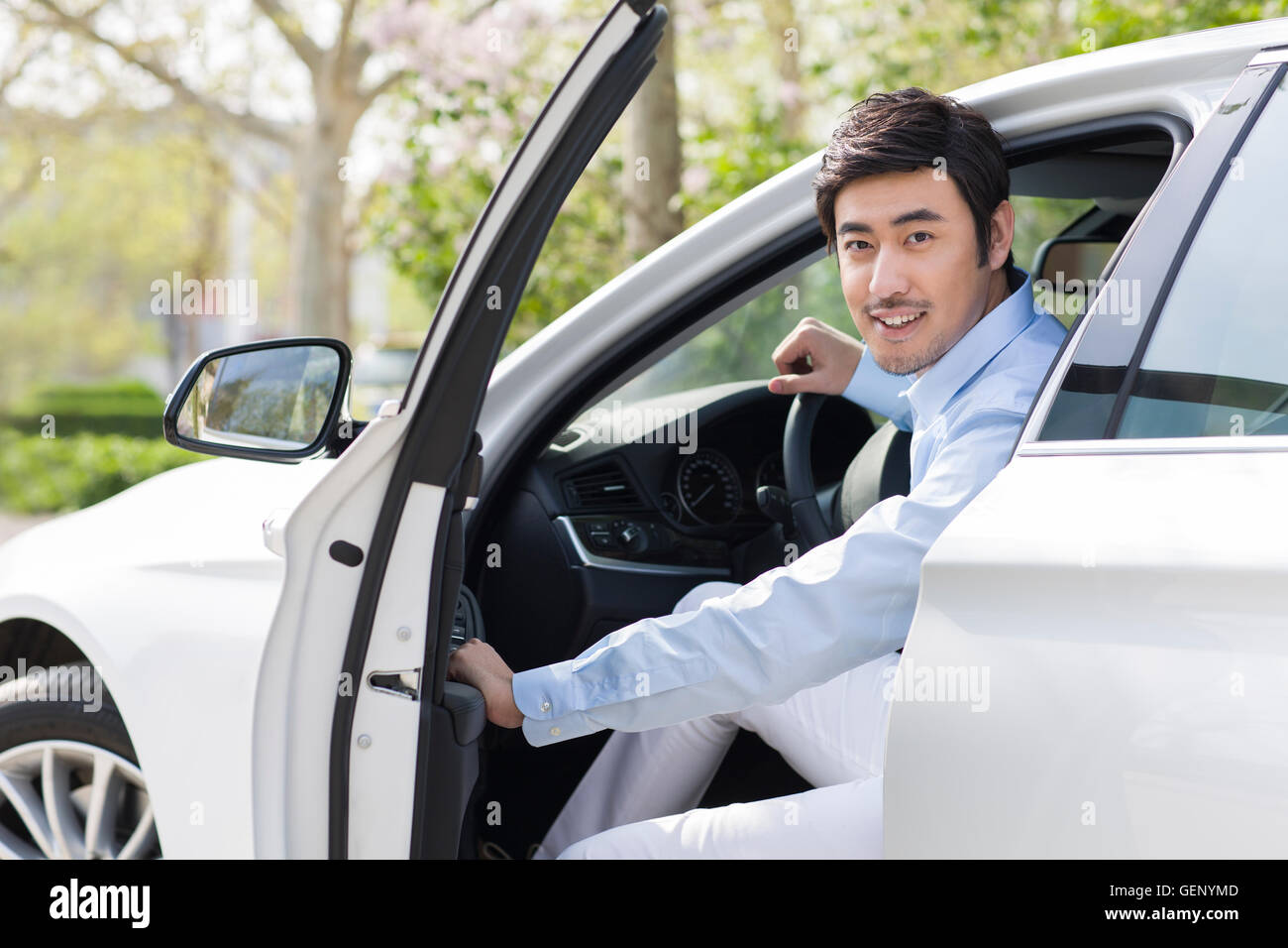 Man Opening Car Door