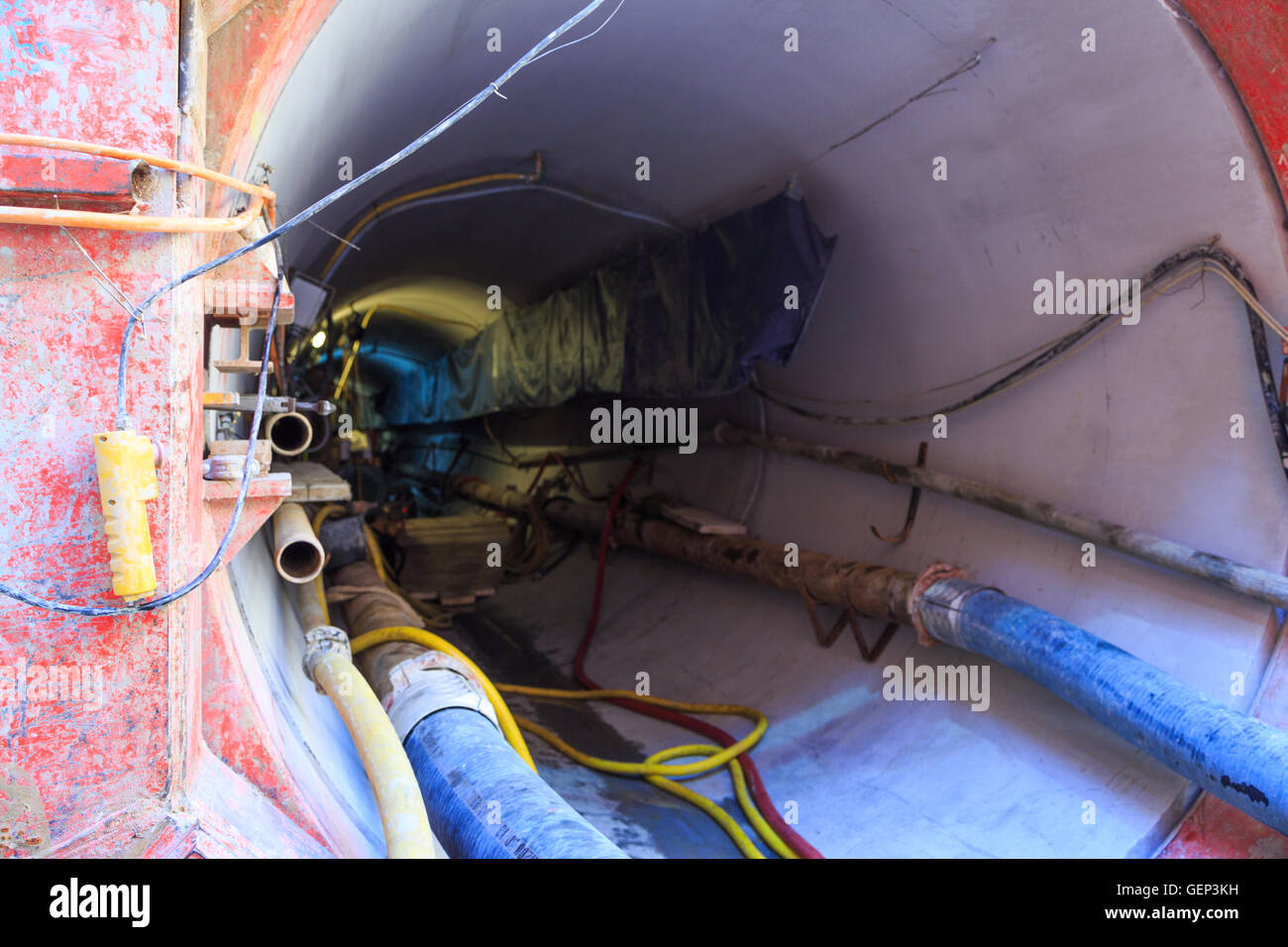 A photograph of the inside of a concrete pipe from a micro-tunneling ...