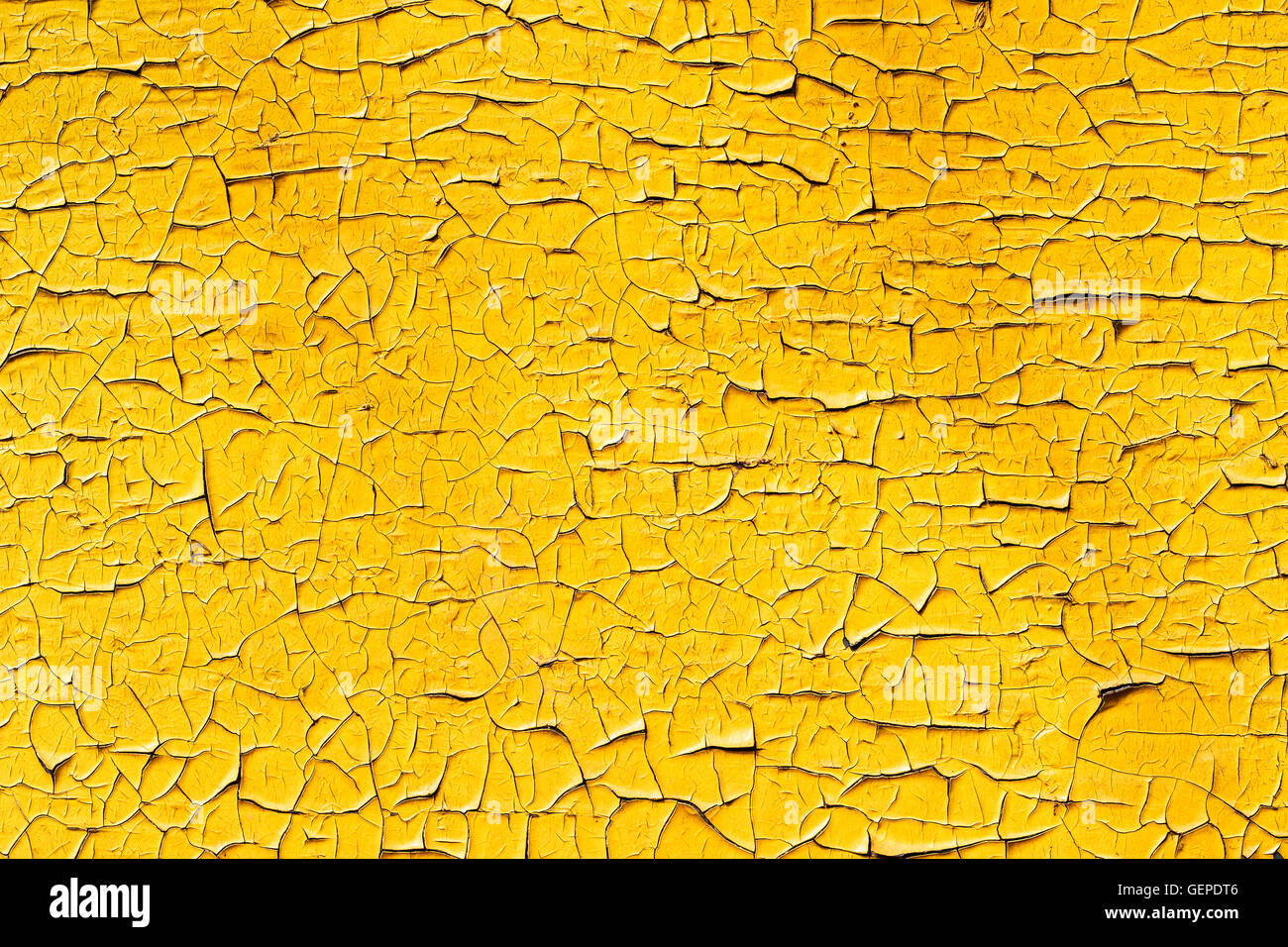 surface of wall covered with cracked yellow paint Stock Photo - Alamy