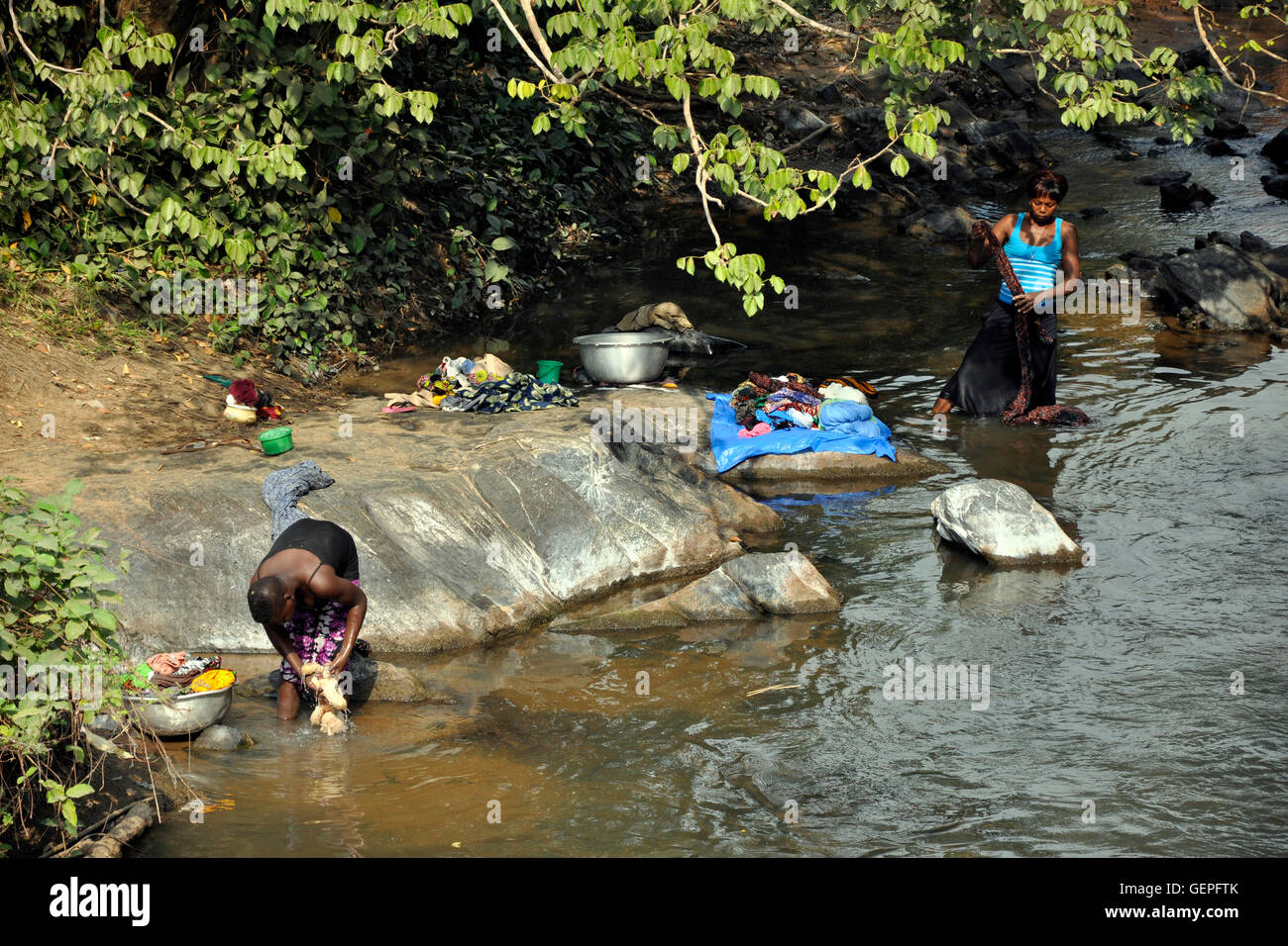 Togo, surrounding of Lomè, washing in the river Stock Photo - Alamy