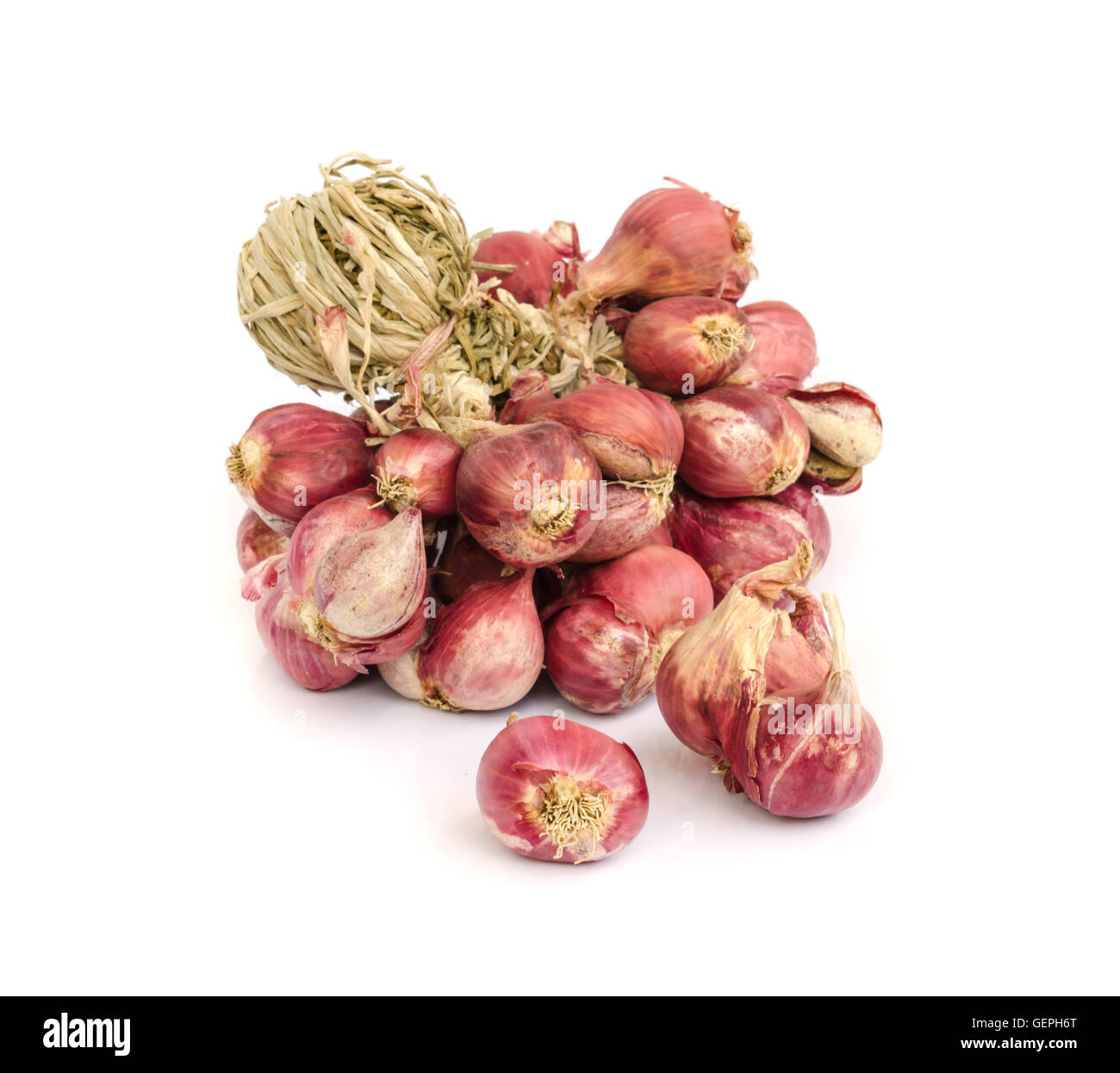 Shallot onions isolated over white background Stock Photo - Alamy