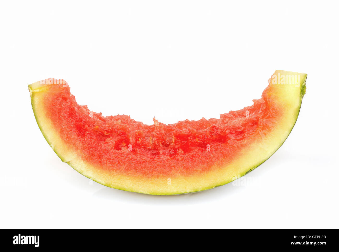 water melon slice with bite isolated on white background Stock Photo ...