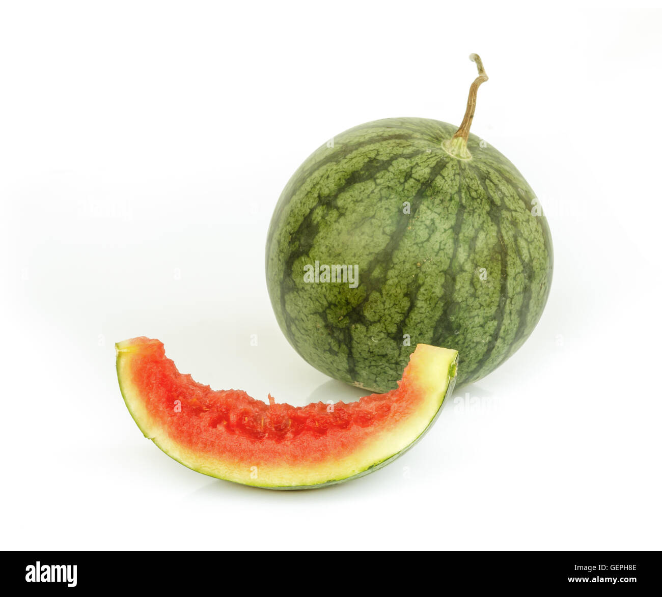 water melon slice with bite isolated on white background Stock Photo ...