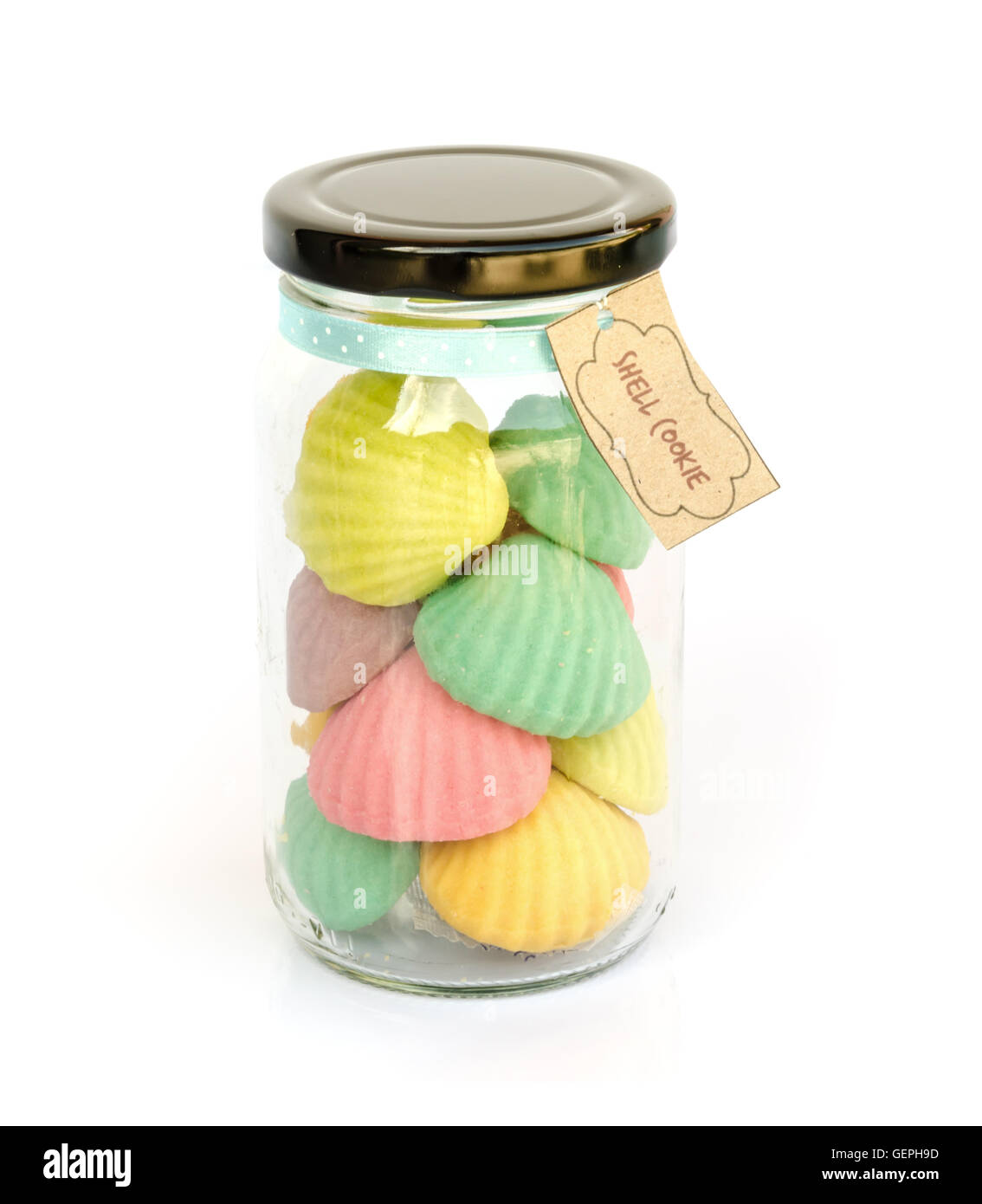 shell cookies with a bottle on white background Stock Photo - Alamy