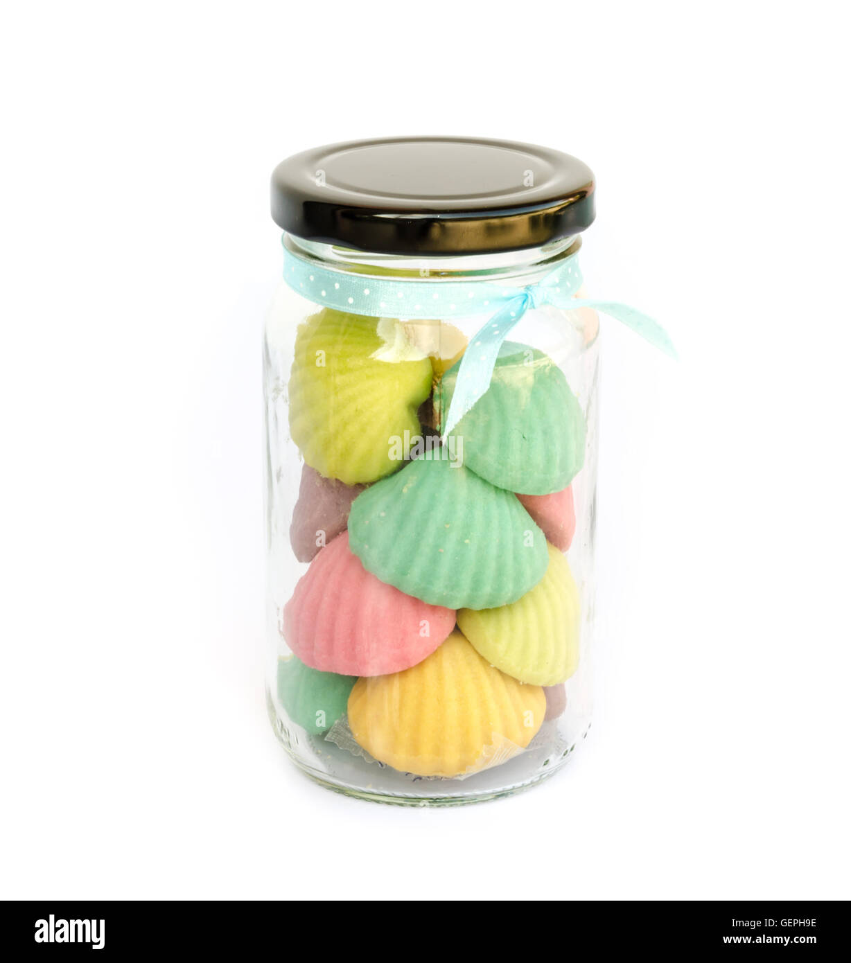 shell cookies with a bottle on white background Stock Photo - Alamy