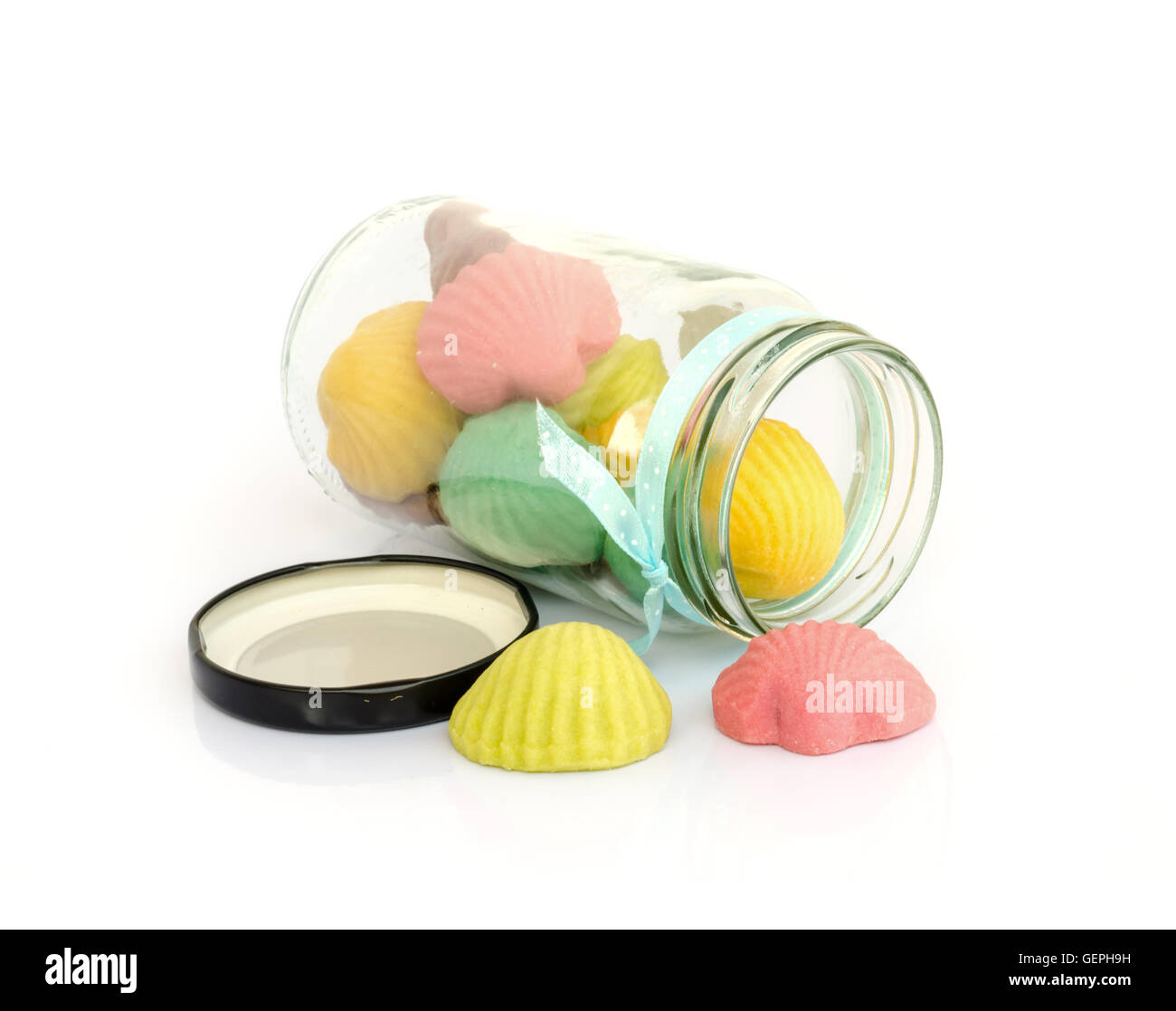 shell cookies with a bottle on white background Stock Photo - Alamy