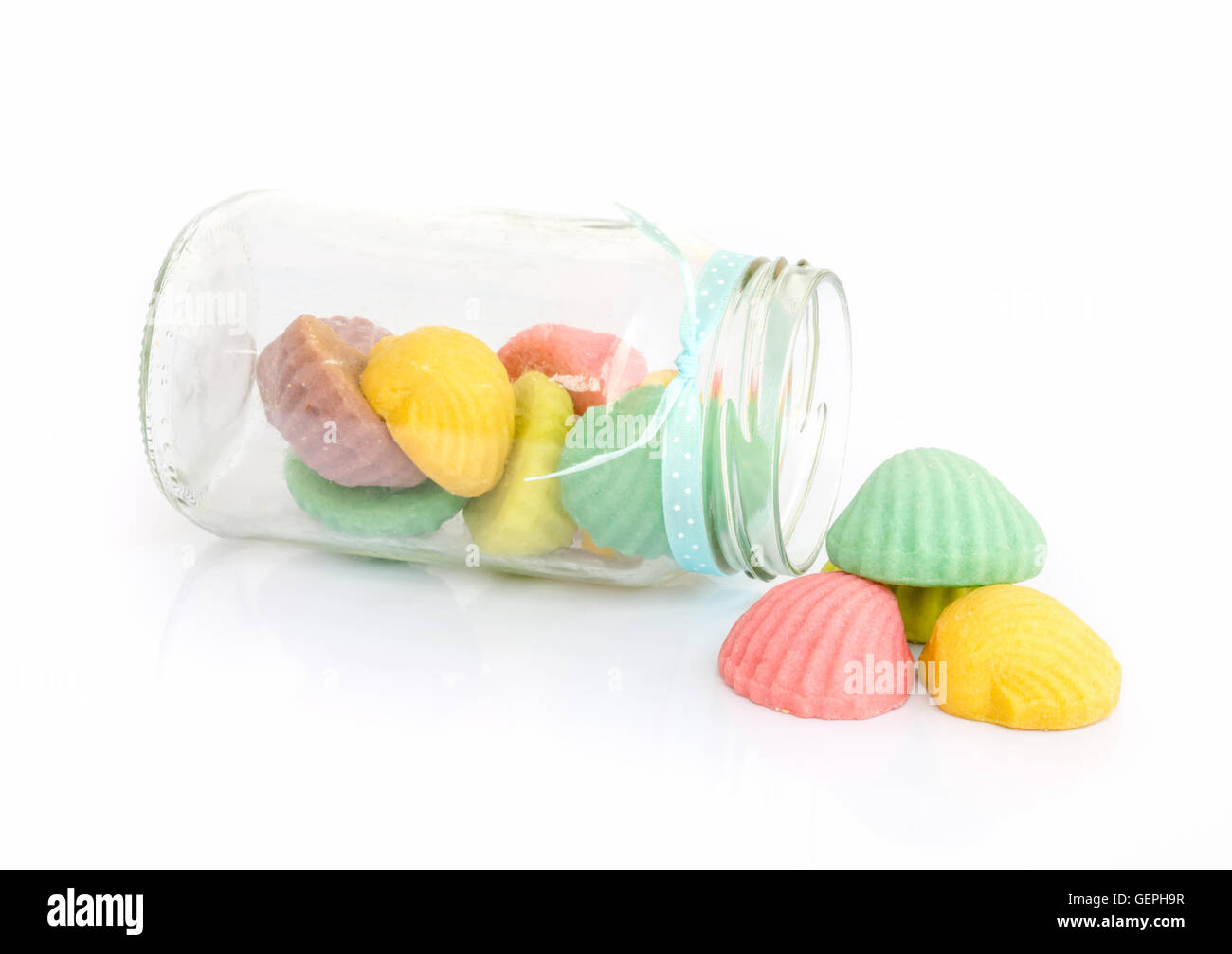 shell cookies with a bottle on white background Stock Photo - Alamy