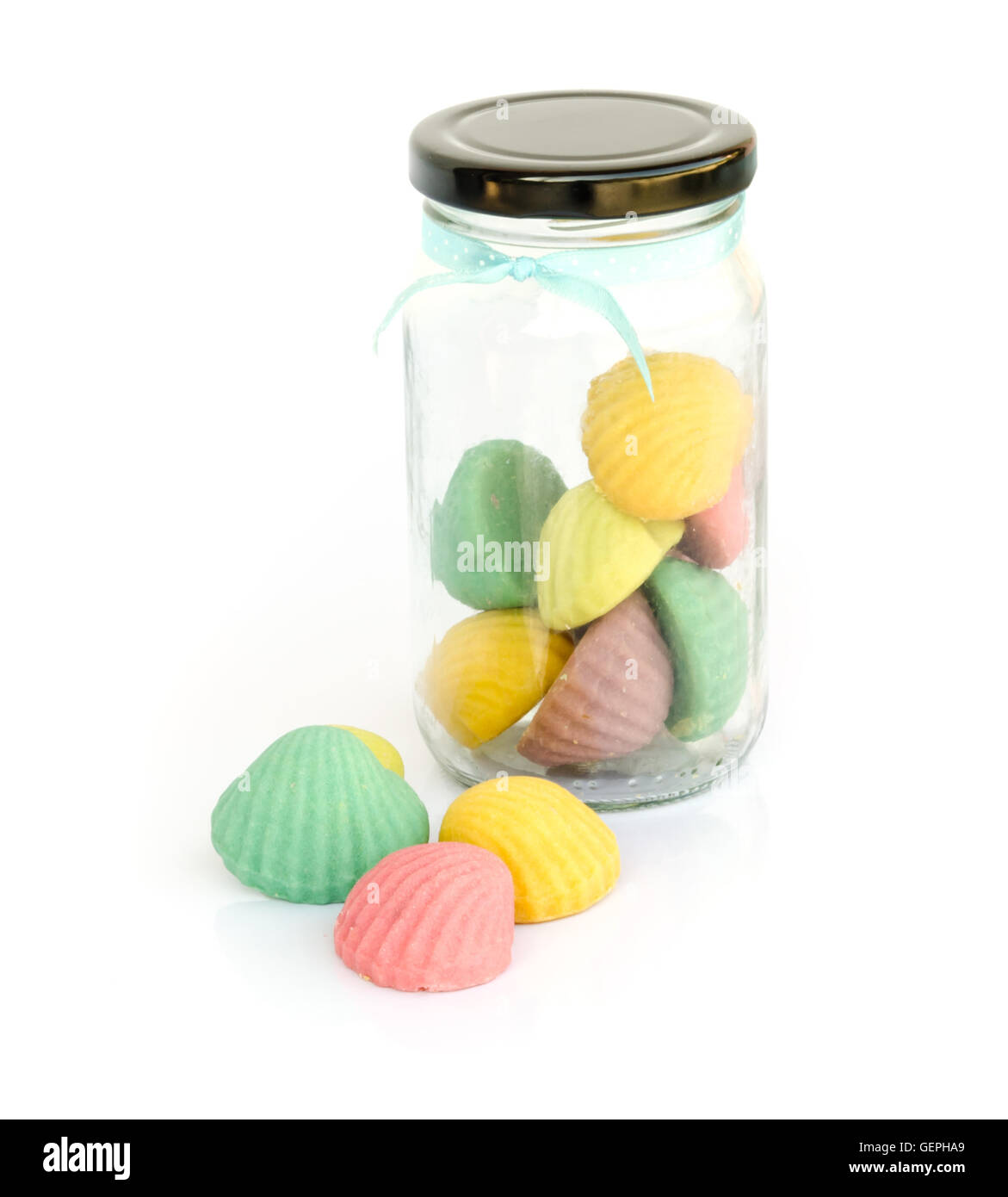 shell cookies with a bottle on white background Stock Photo - Alamy