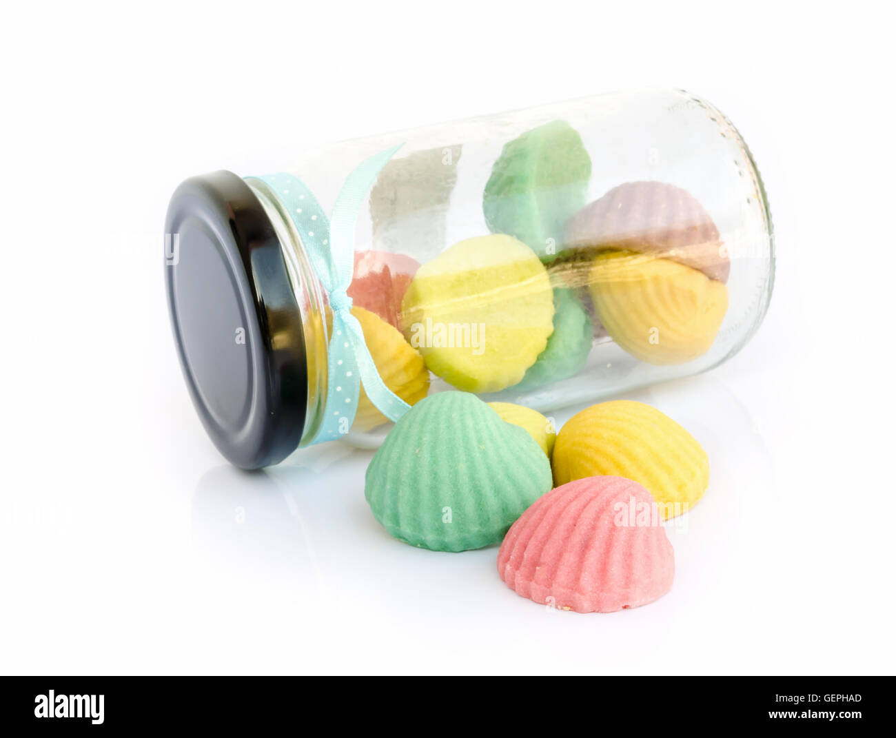 shell cookies with a bottle on white background Stock Photo - Alamy