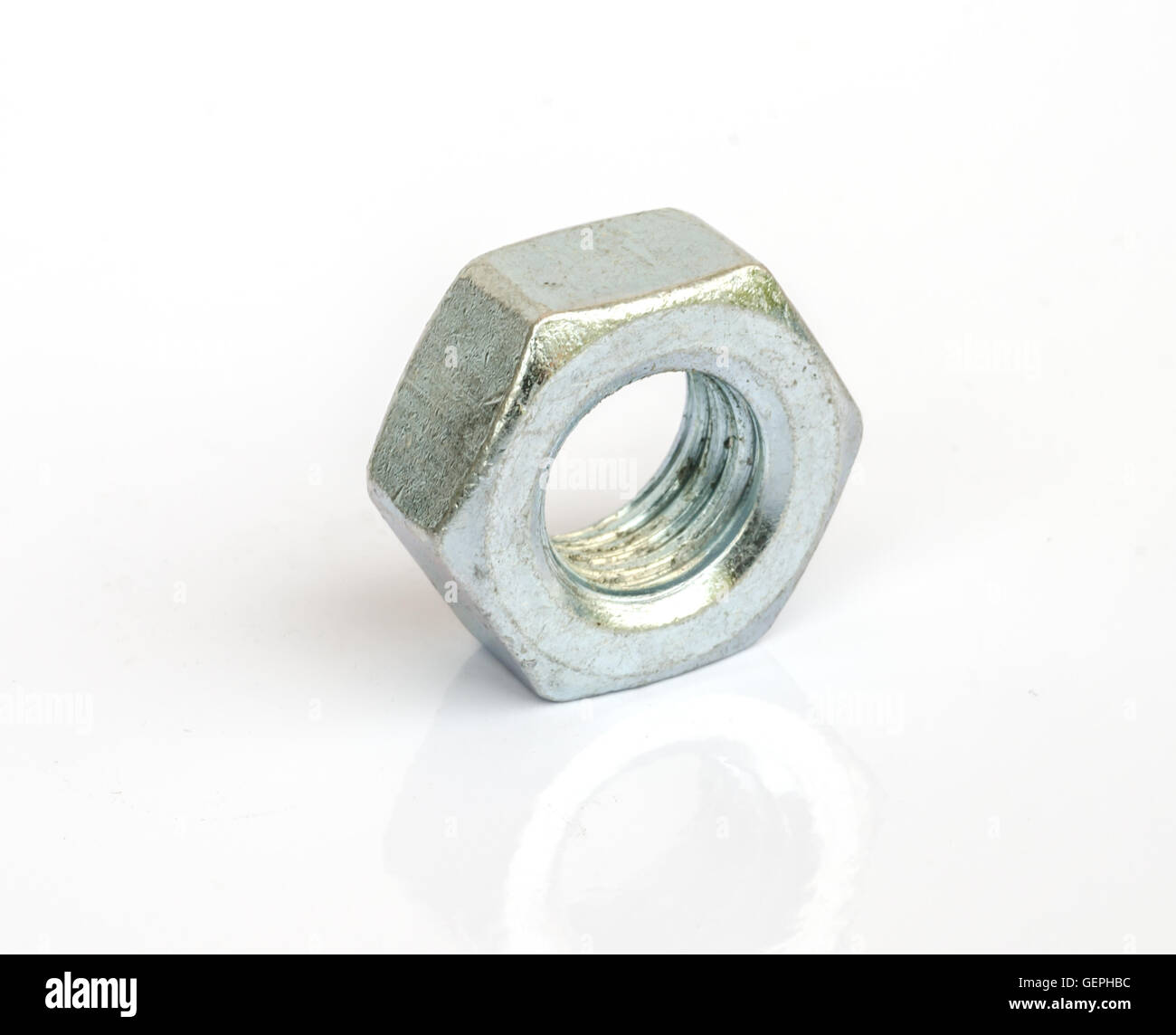 Closeup metal nut isolated on white background Stock Photo - Alamy