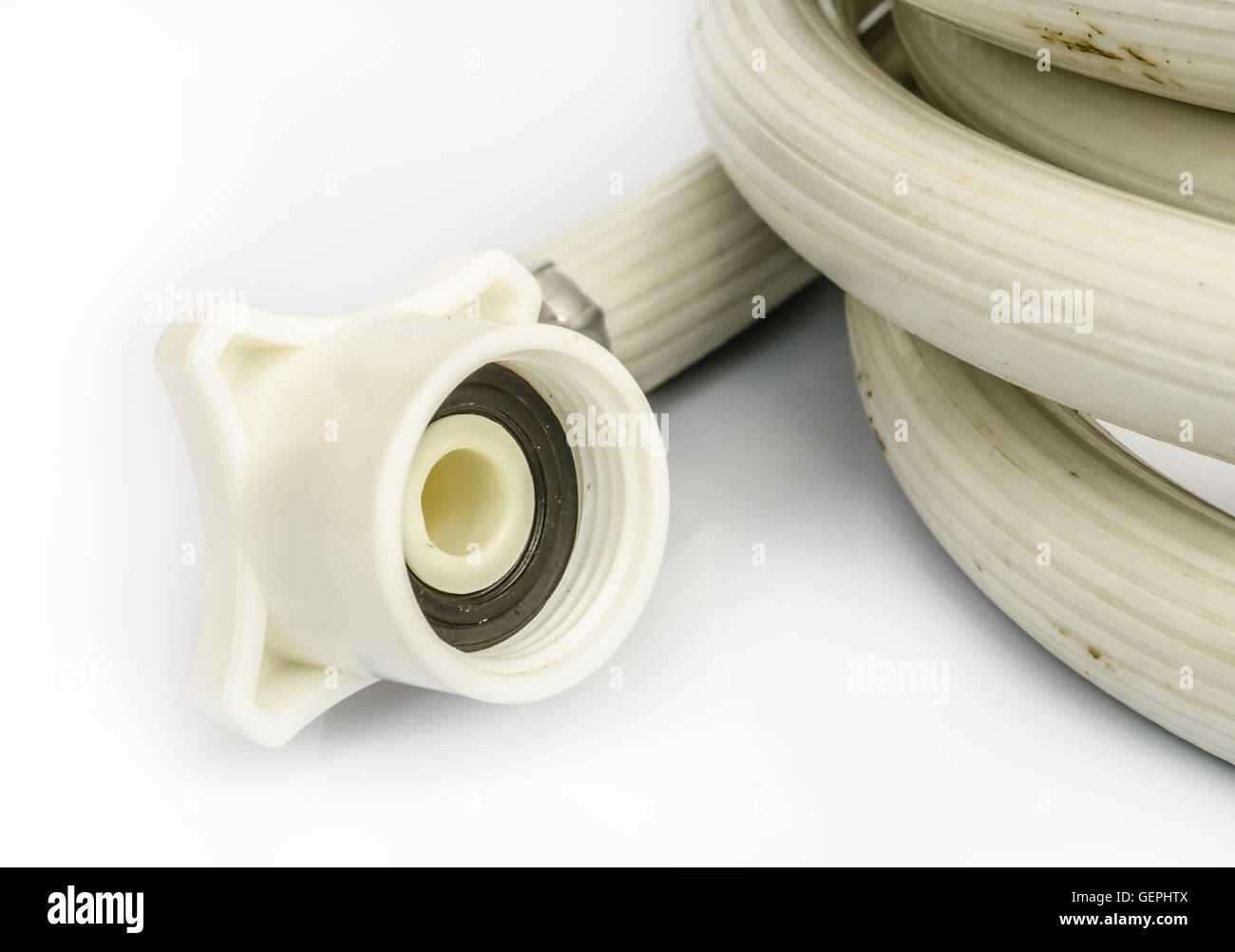 industrial elastic rubber water pipe with connectors on white ...