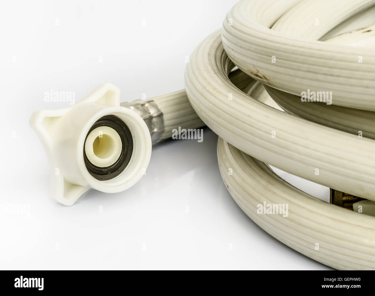 industrial elastic rubber water pipe with connectors on white ...