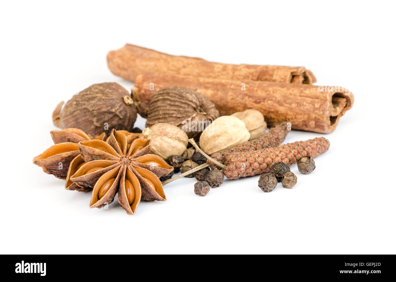 Star Anise and other spices on white background Stock Photo - Alamy