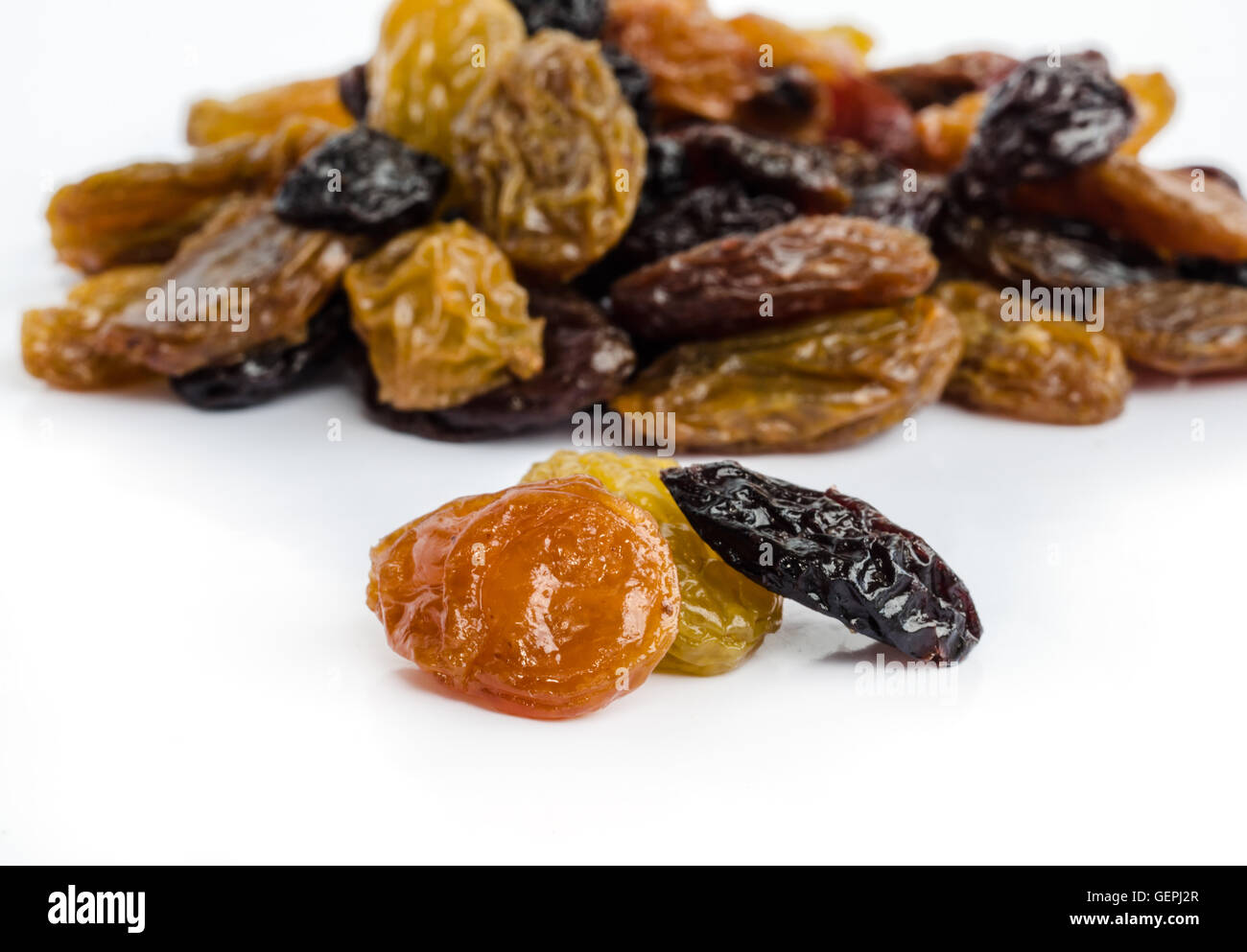 Sweet mix dried fruits on white background Stock Photo - Alamy