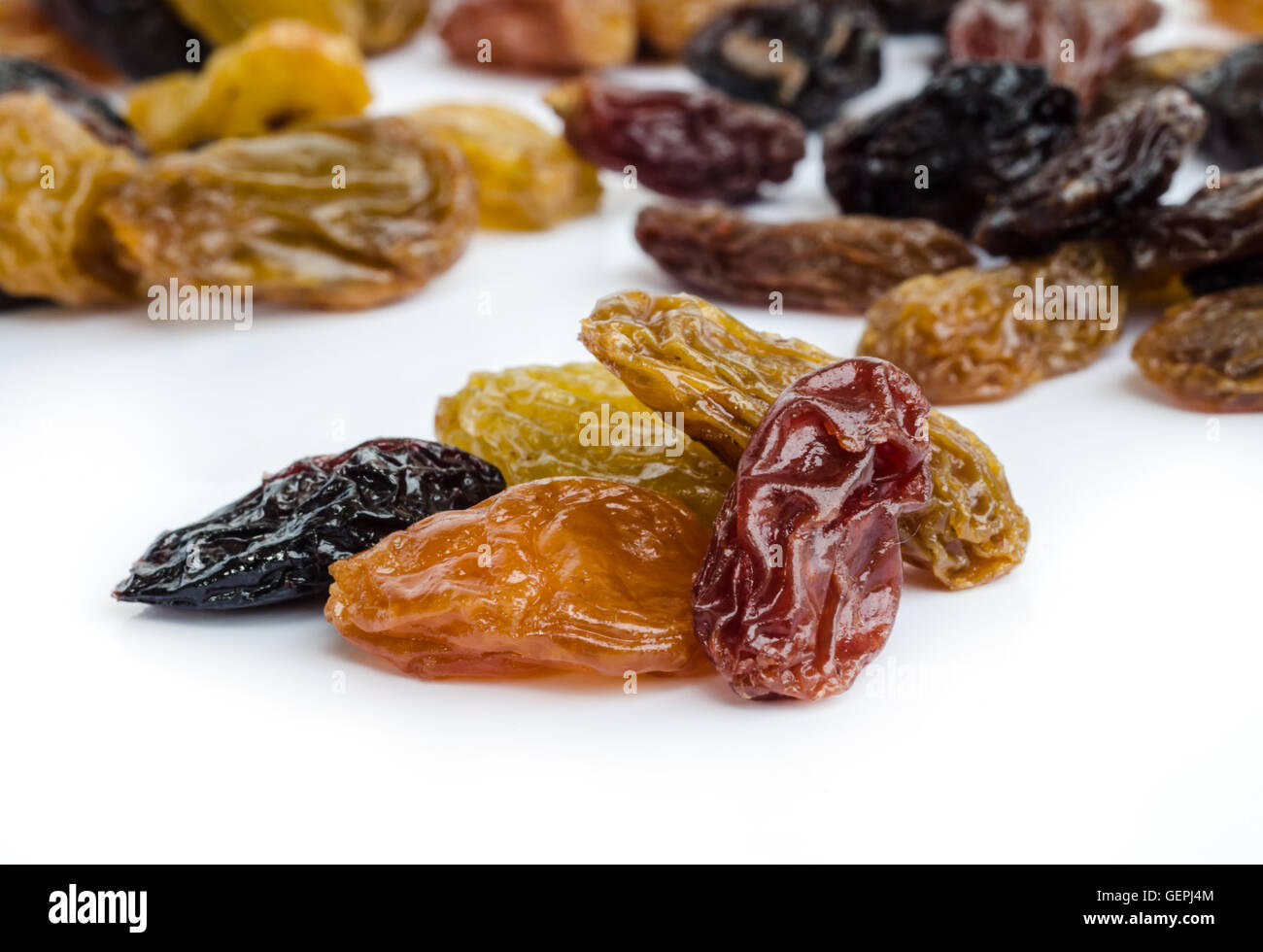 Sweet mix dried fruits on white background Stock Photo - Alamy