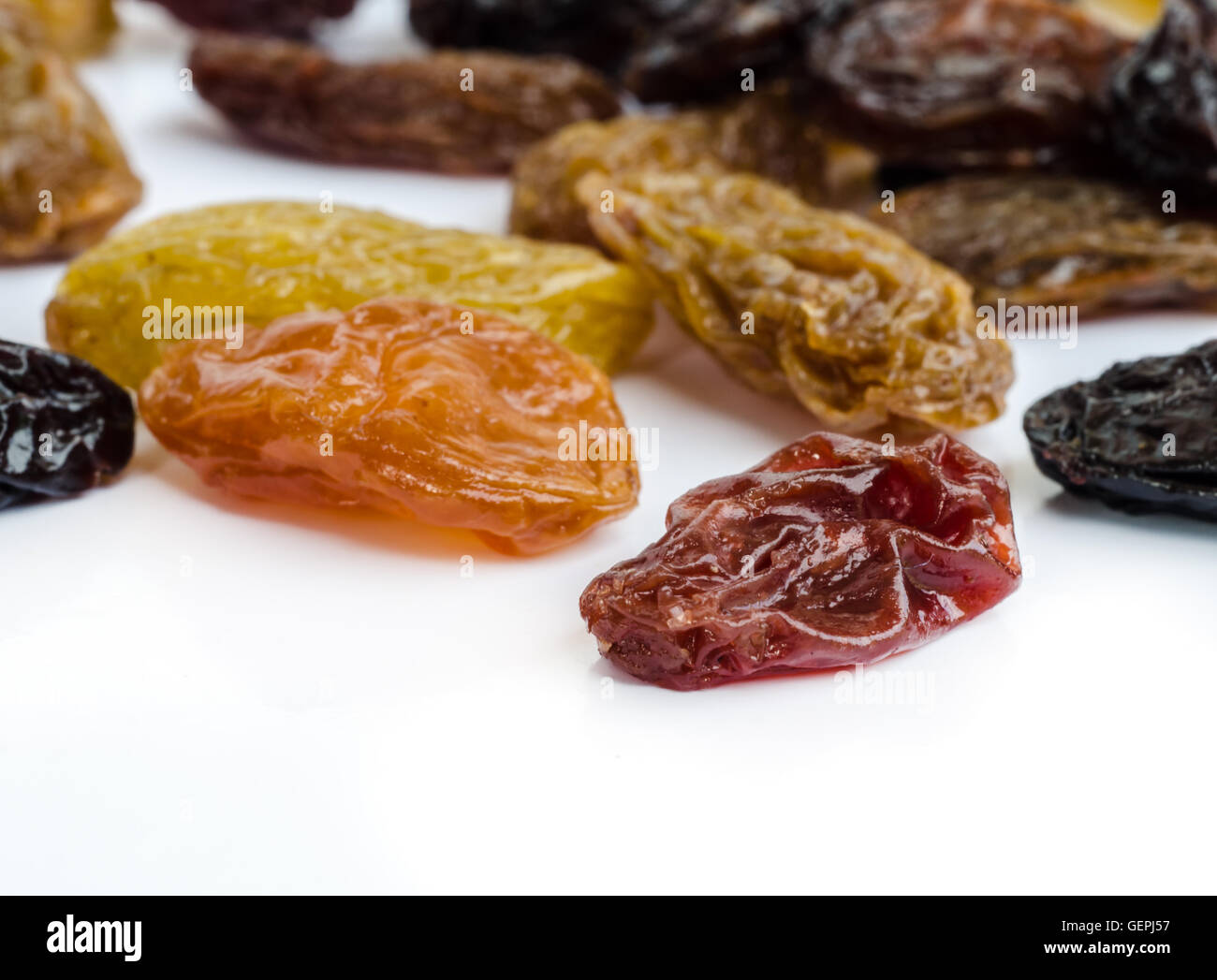 Sweet mix dried fruits on white background Stock Photo - Alamy