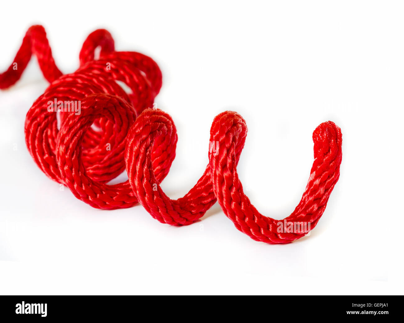Red Rope with a spiral Isolated On White Background Stock Photo - Alamy