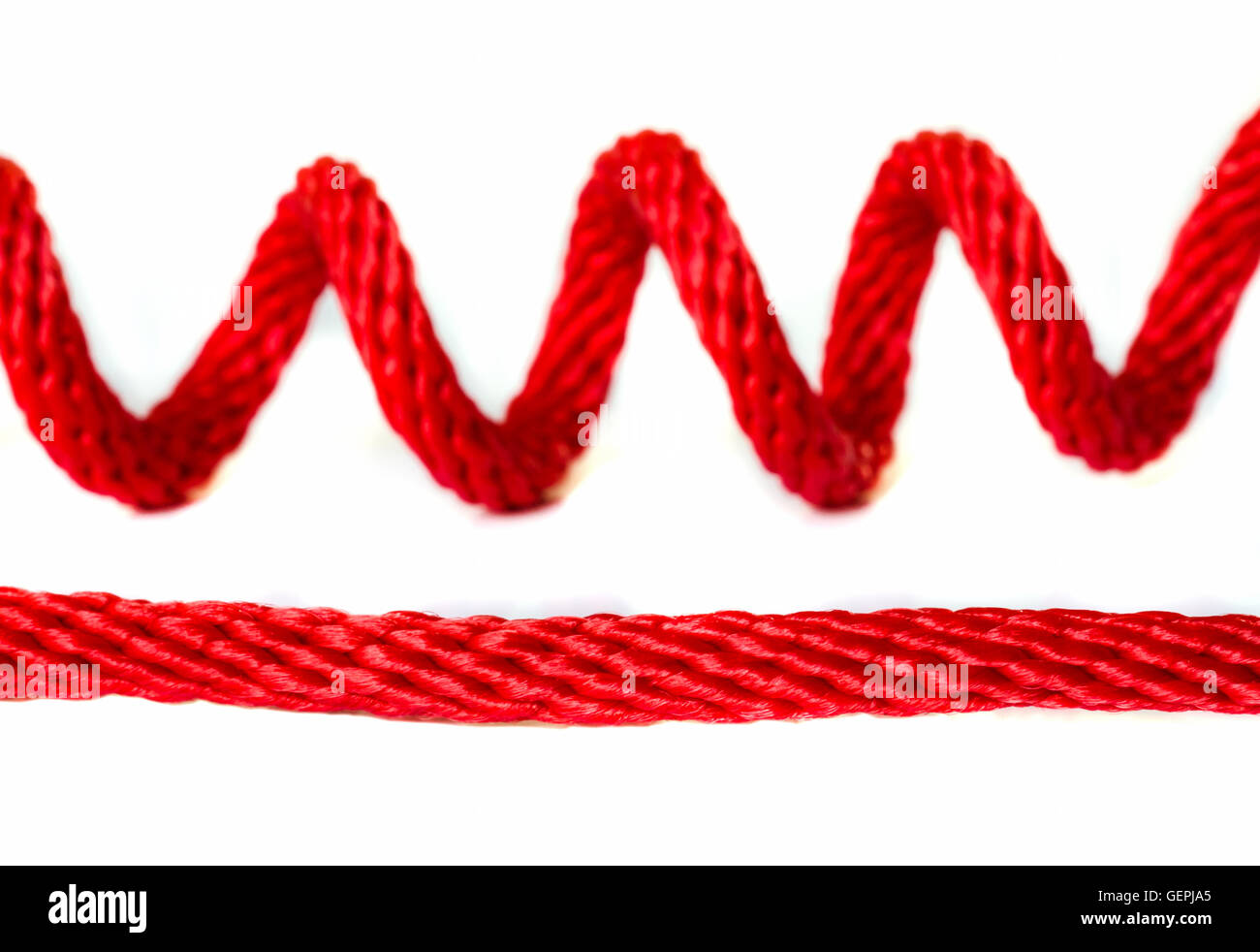 Red Rope with a spiral Isolated On White Background Stock Photo - Alamy