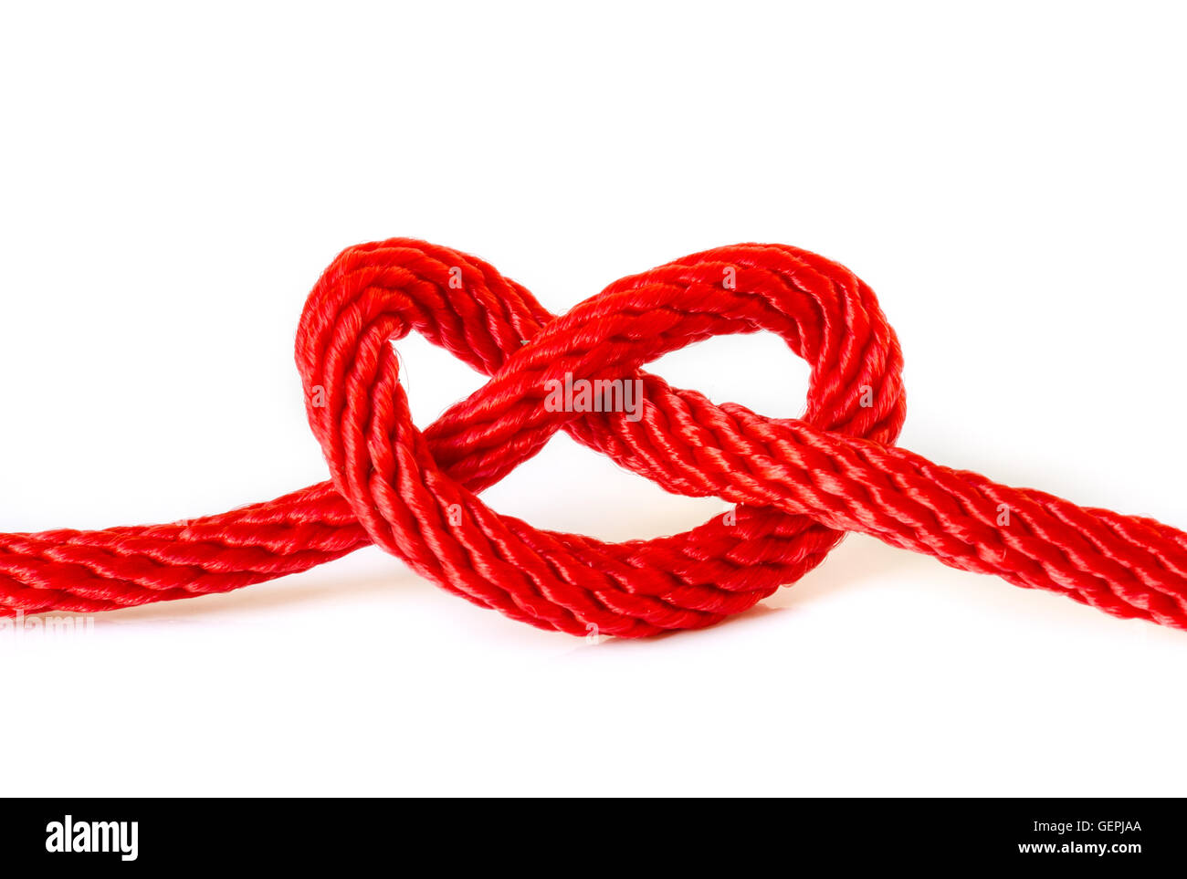 Red rope with a knot isolated on white Background Stock Photo - Alamy