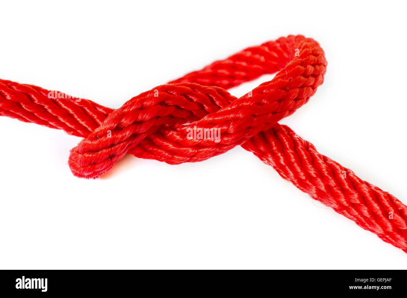 Red rope with a knot isolated on white Background Stock Photo - Alamy