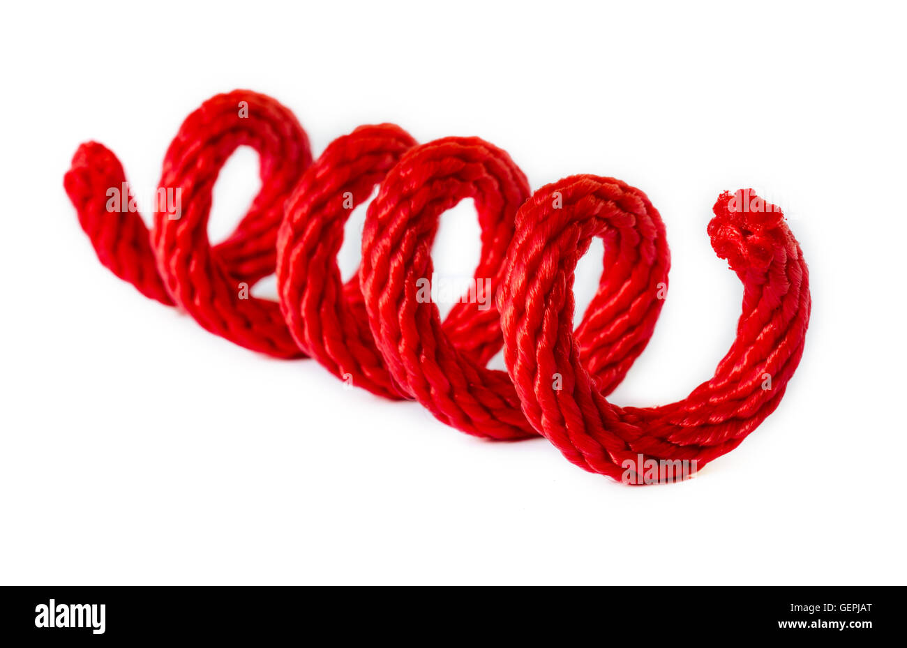 Red Rope with a spiral Isolated On White Background Stock Photo - Alamy