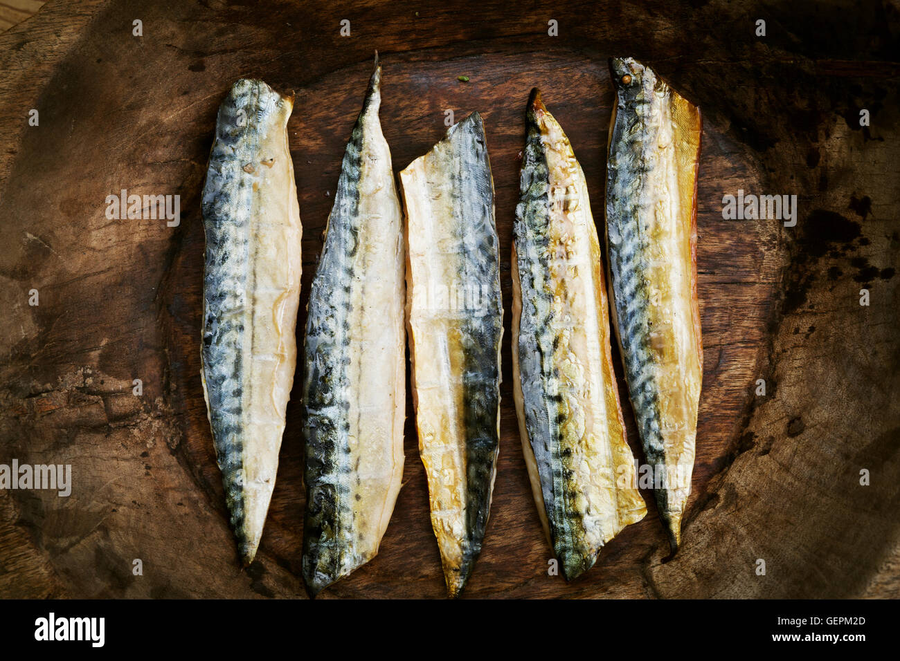 Smoked fish fillets laid out in a row Stock Photo - Alamy